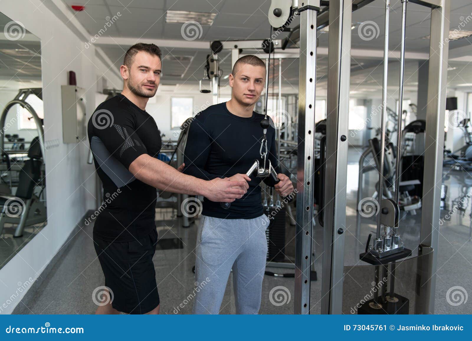 Personal Trainer Helping Client in Gym Stock Image - Image of diet ...