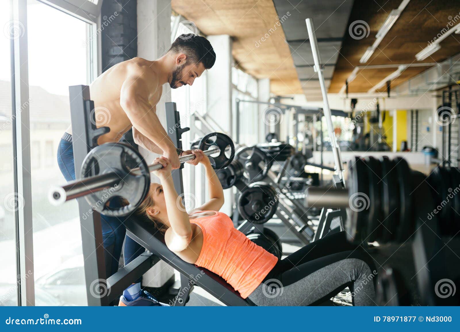 Personal trainer helping stock image. Image of bell, club - 78971877