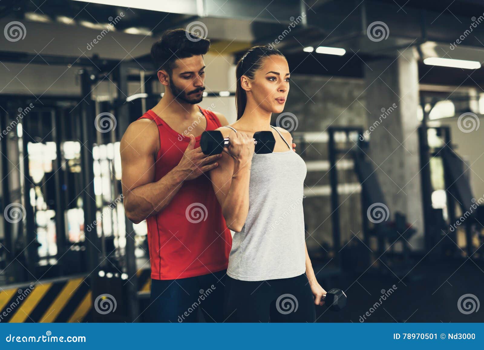 Personal Trainer Instructing Trainee Stock Image - Image of exercising ...