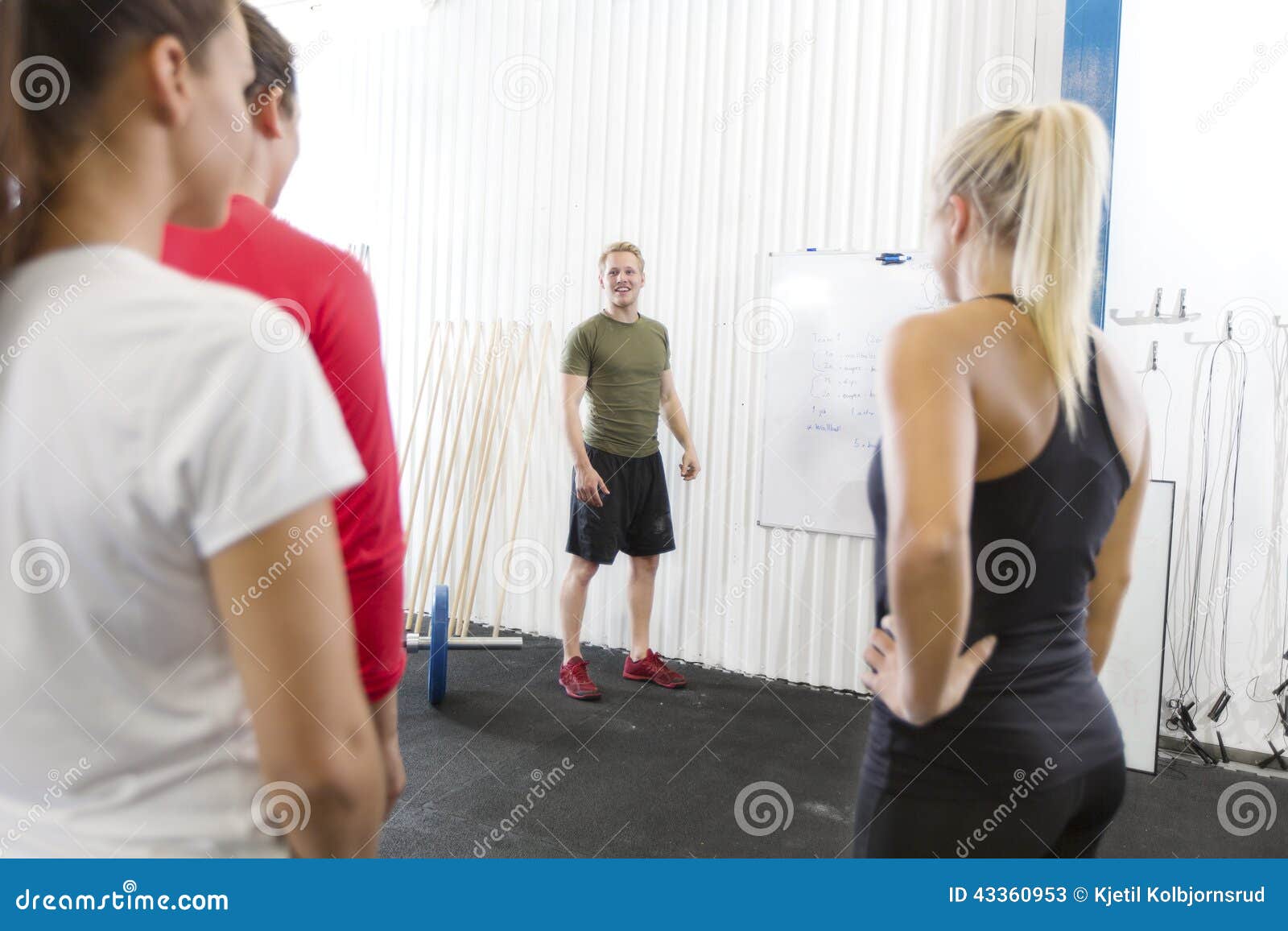 Personal Trainer Instructs Fitness Workout Team Stock Image - Image of ...