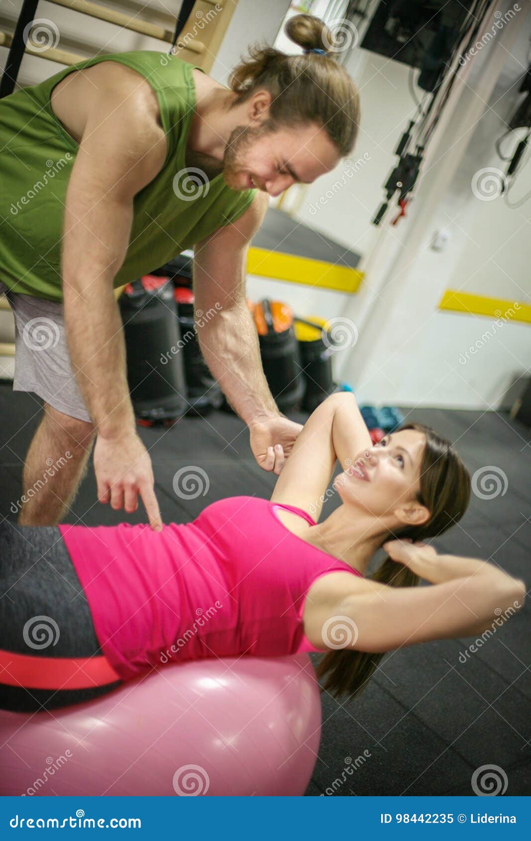 Personal Trainer Training His Client in the Gym. Stock Image - Image of ...