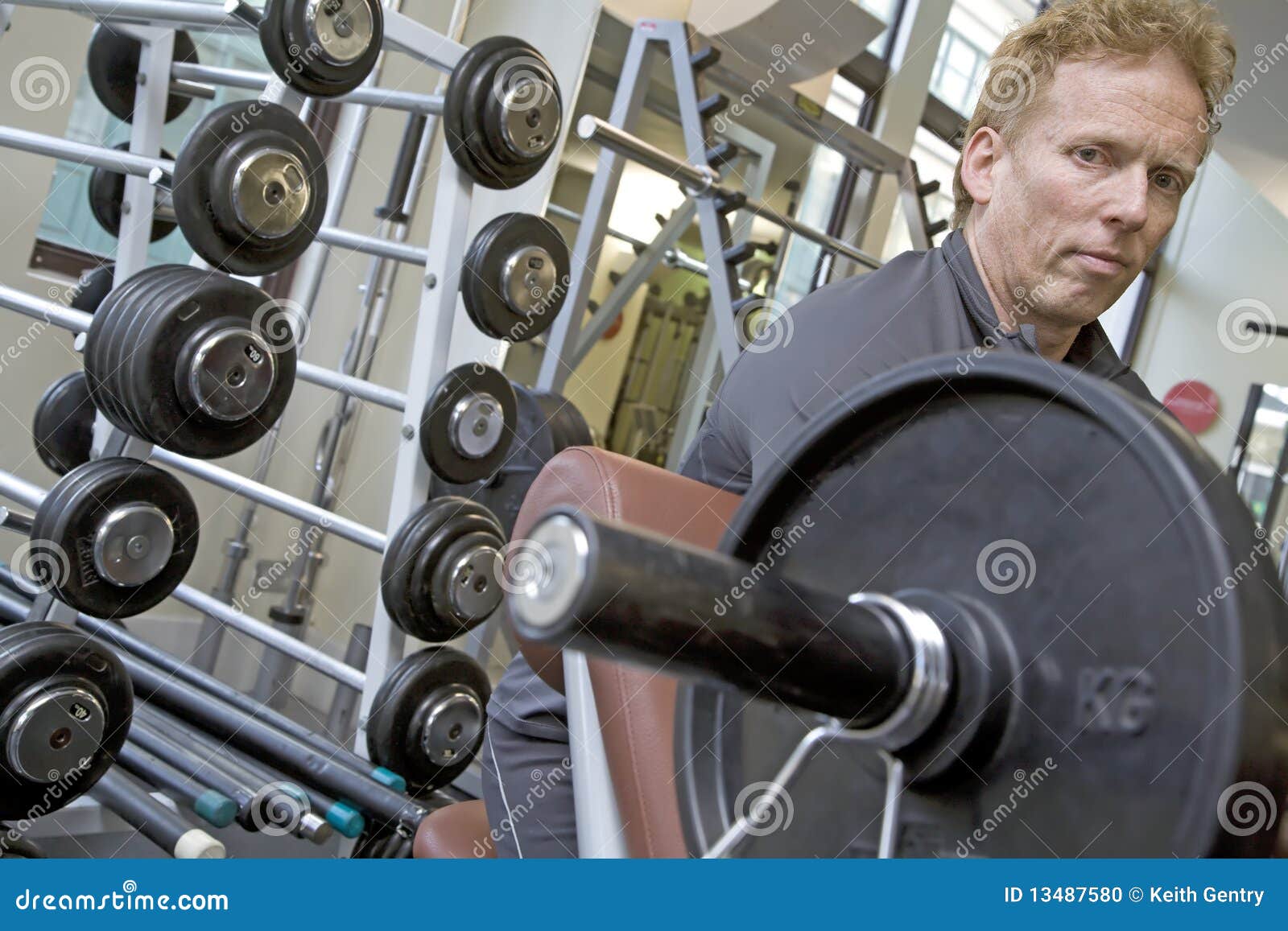 Personal Trainer Working Biceps on a Bench Stock Photo - Image of power ...