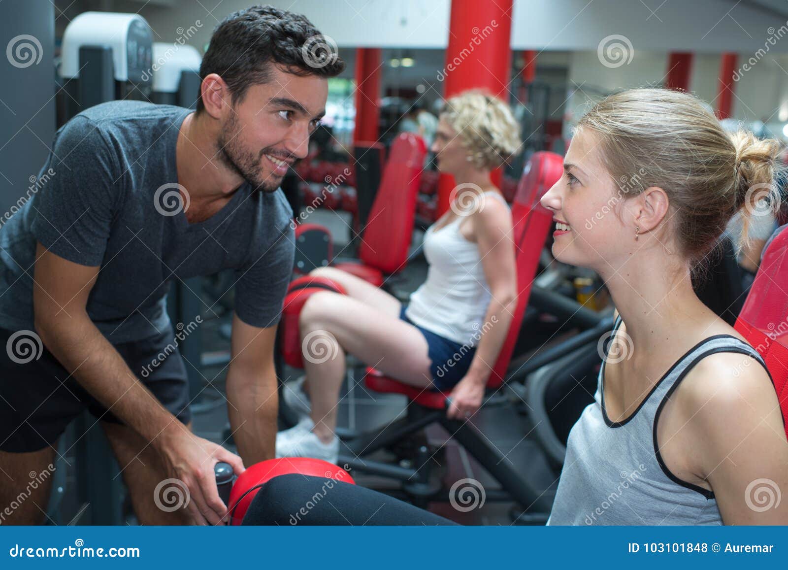 Personal Trainer Working with Client in Gym Stock Photo - Image of ...