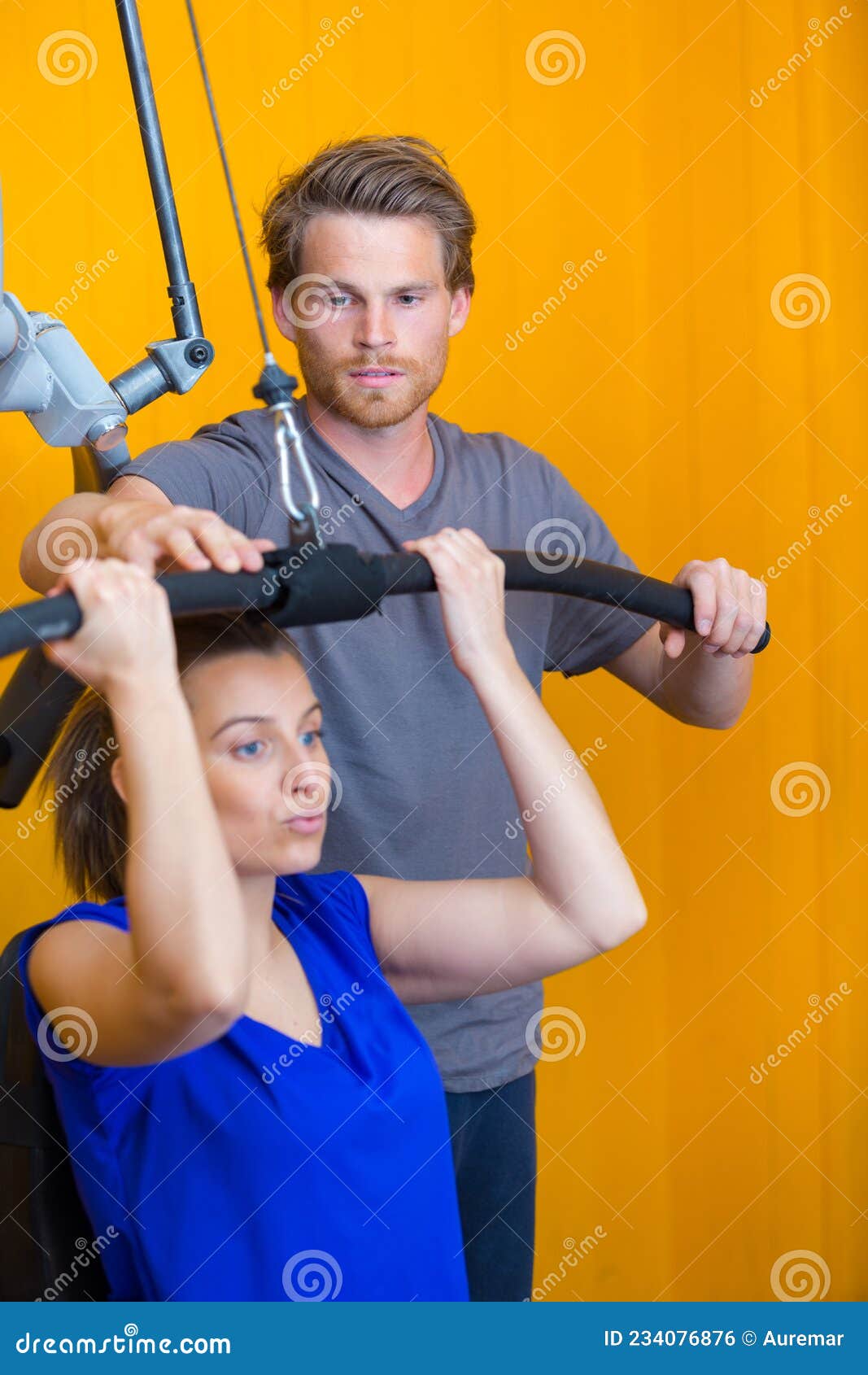 Personal Trainer Working with Client in Gym Stock Photo - Image of ...