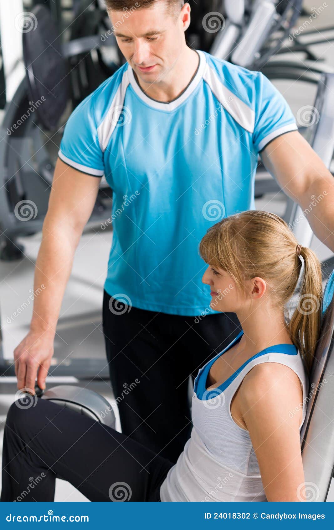 Personal Trainer with Young Woman at Gym Stock Photo - Image of healthy ...