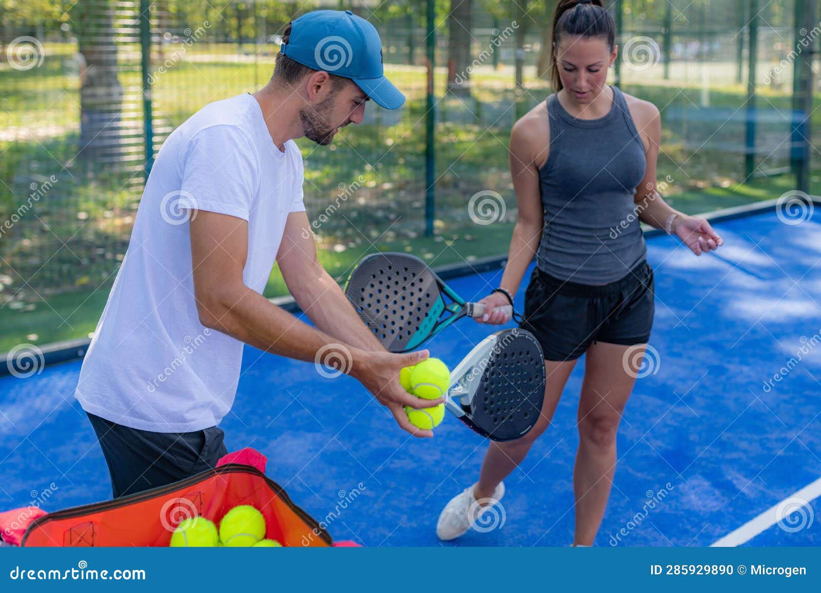 Experience Personalized Padel Training As a Male Coach Skillfully Helps ...