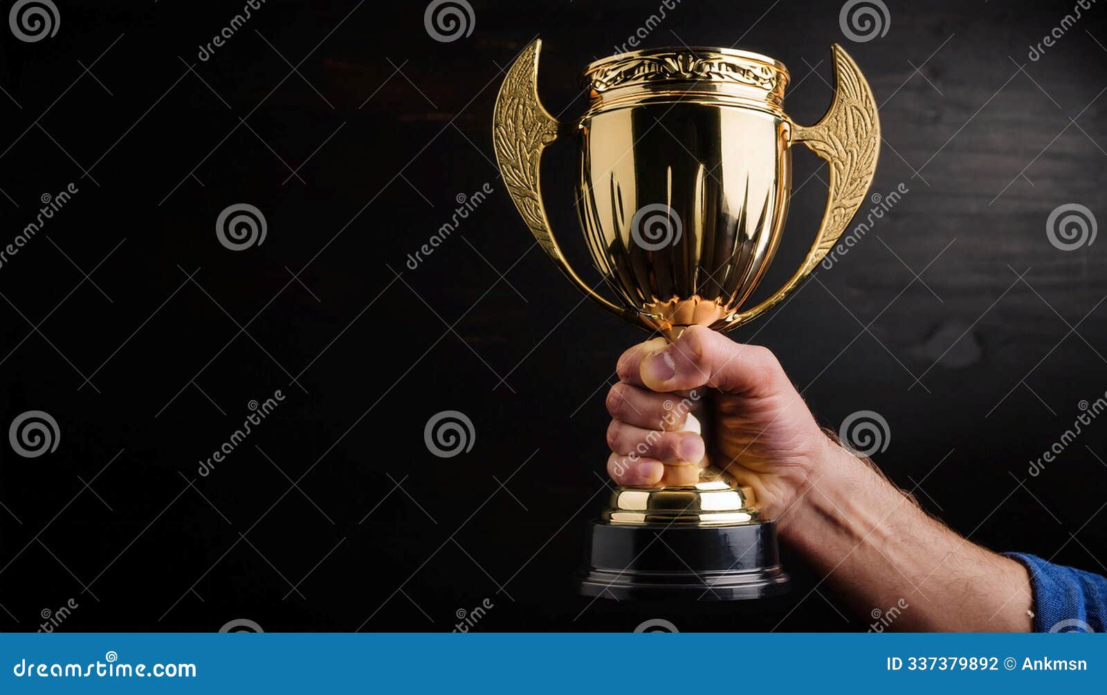 Persons Hand Holding a Trophy, Symbolizing Achievement, Perseverance ...