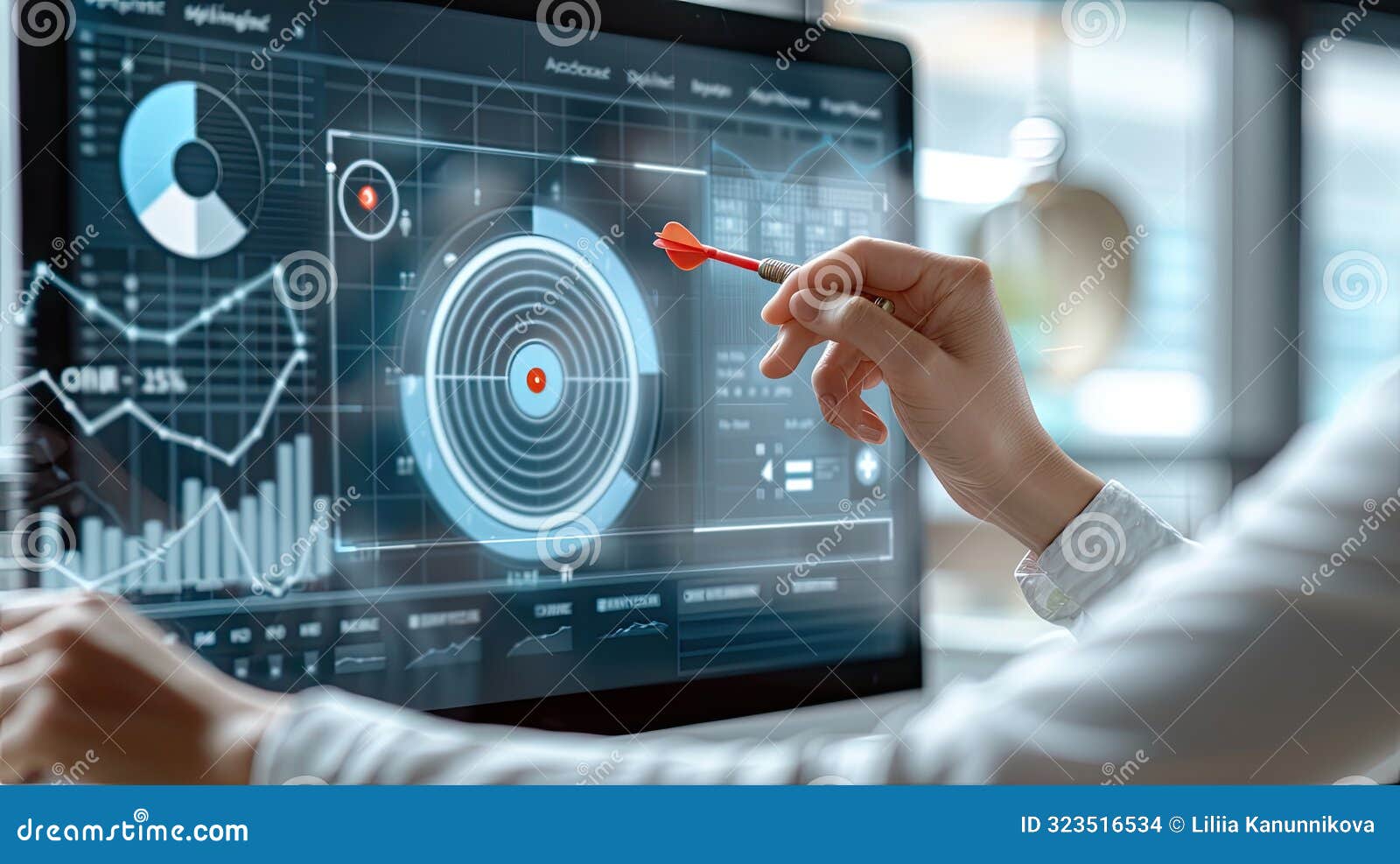 A Persons Hand Holds a Dart in Front of a Computer Screen Displaying ...