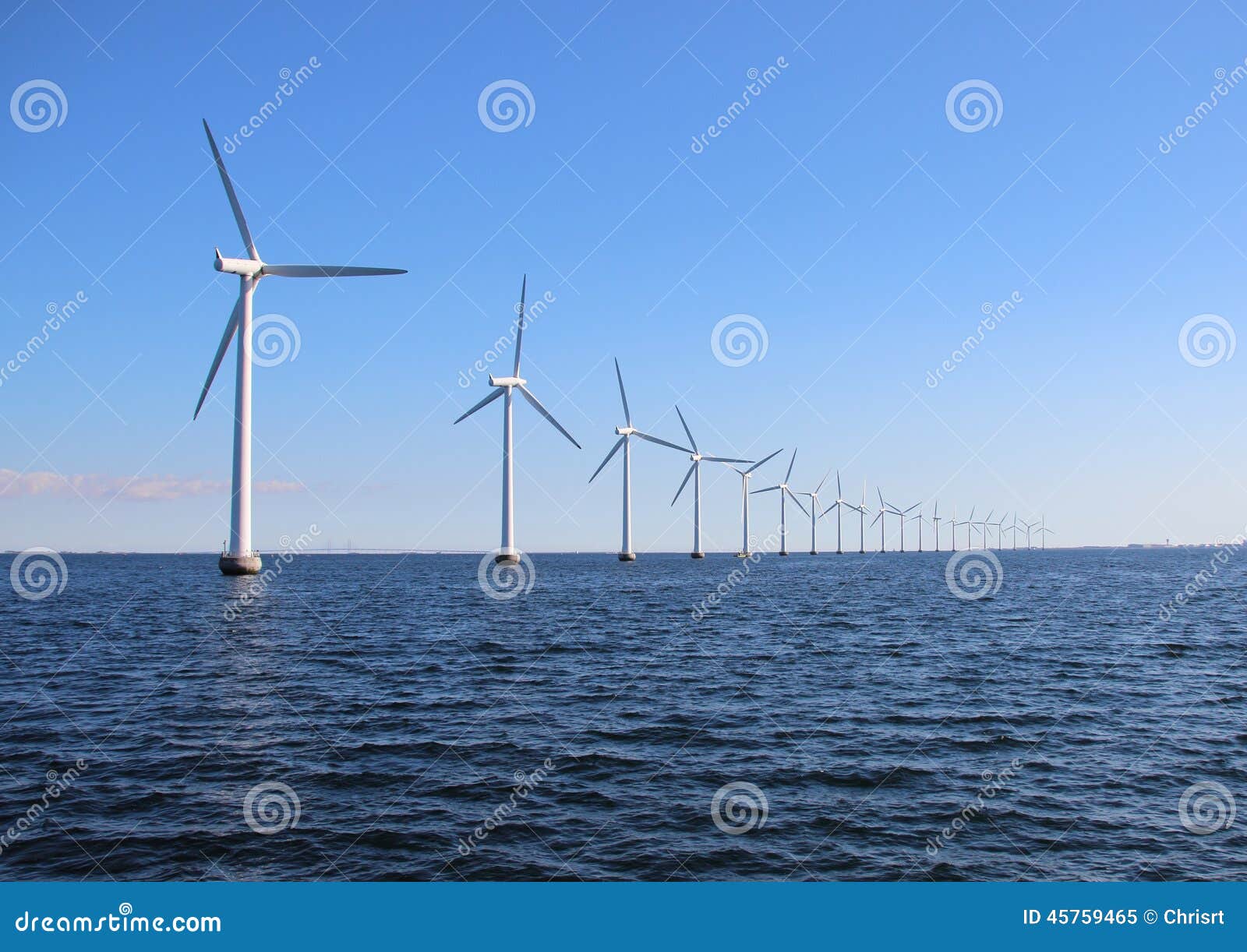 Perspective Line of Ocean Wind Mills with Dark Water and Sky Stock ...
