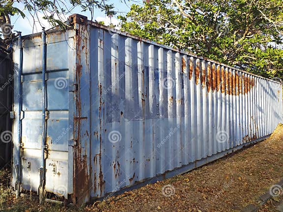 Perspective of Old Rusty Container. Old Rusty Blue Shipping Container ...