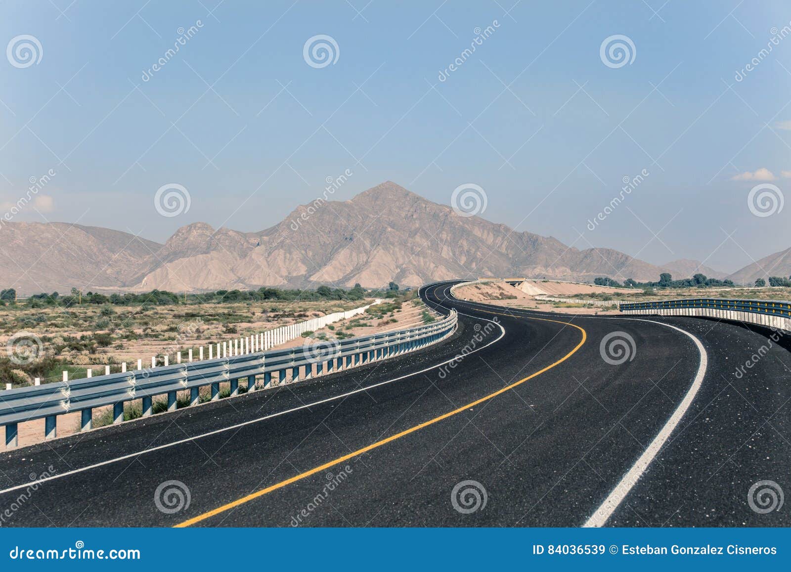 Perspective of a Road with Mountains in the Background Stock Image ...