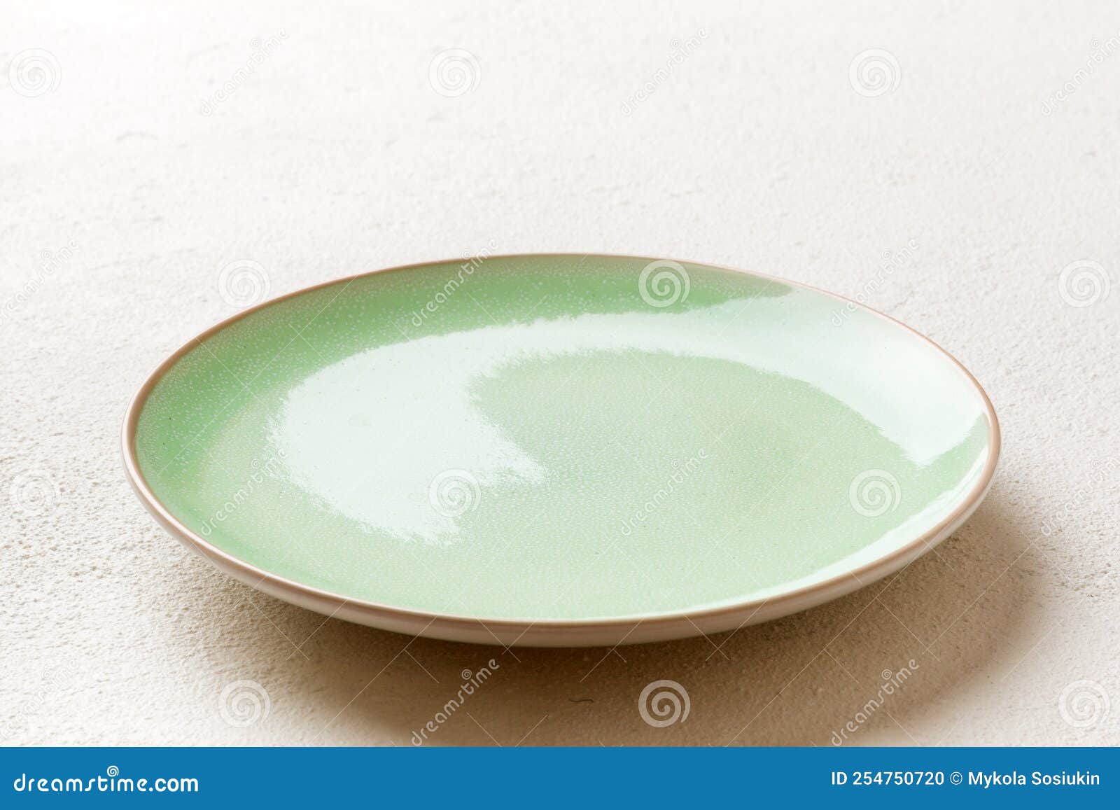 Perspective View of Empty Green Plate on Cement Background. Empty Space ...