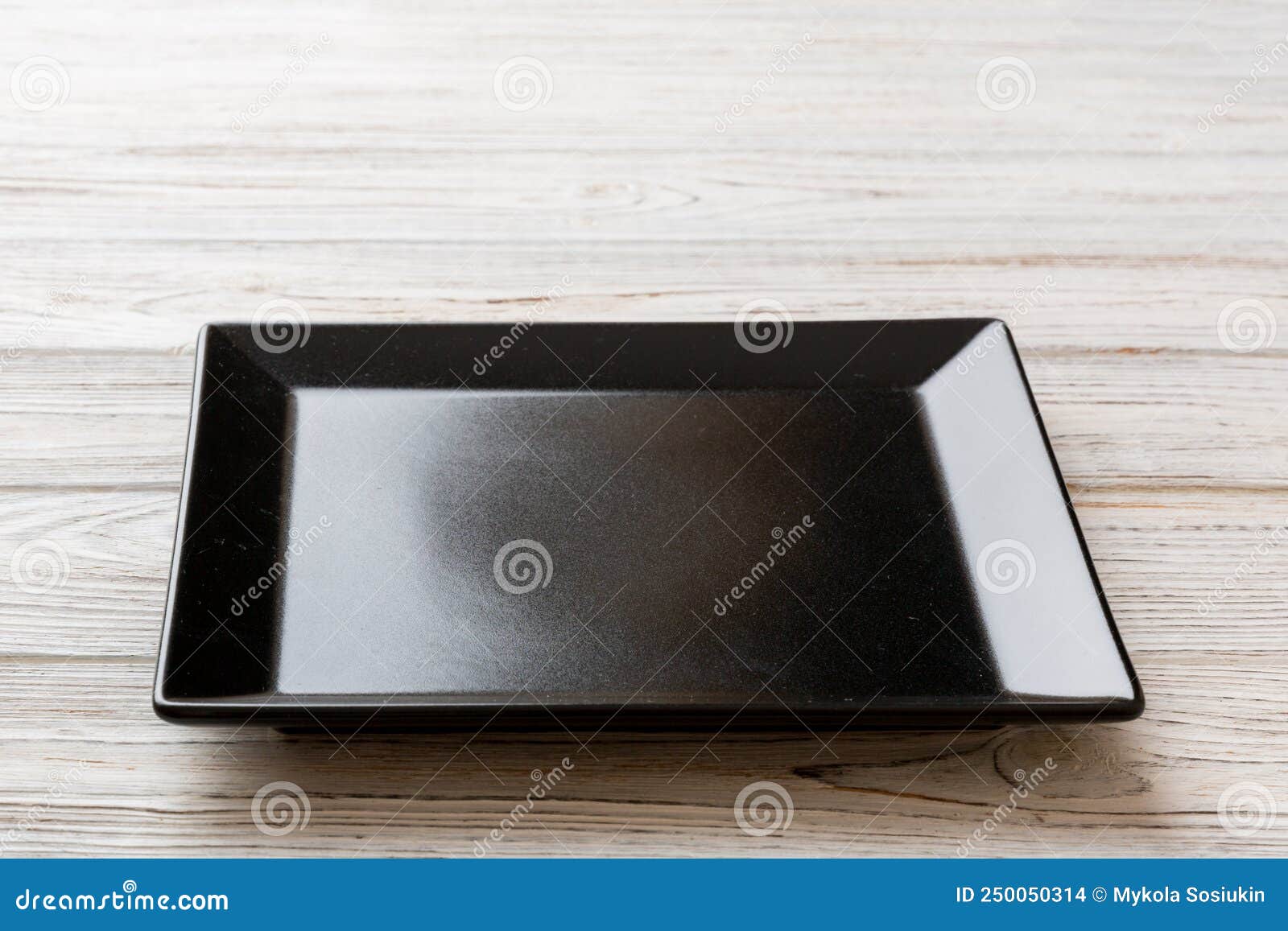 Perspective View of Empty Square Plate on Wooden Background. Empty ...