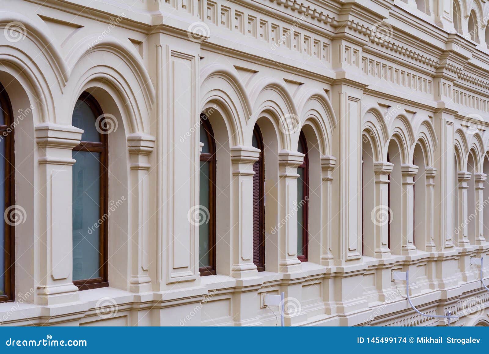 A Facade of Ancient Stone Building with Decorative Ornaments and ...