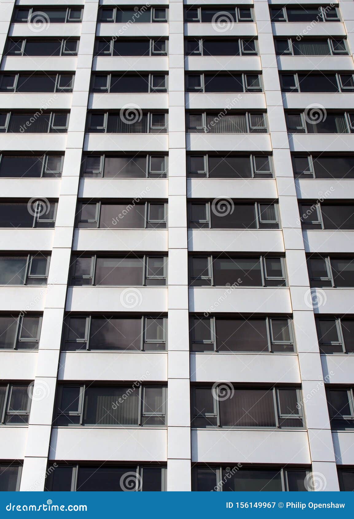 Facade of a Modern Commercial Building with Geometric Repeating Windows ...
