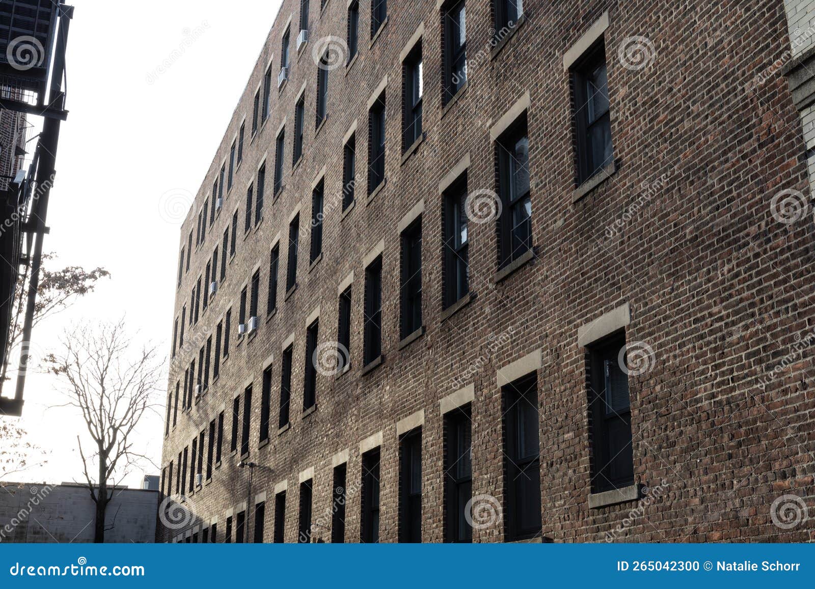 Perspective View of a Featureless Brick Urban Apartment Building with ...