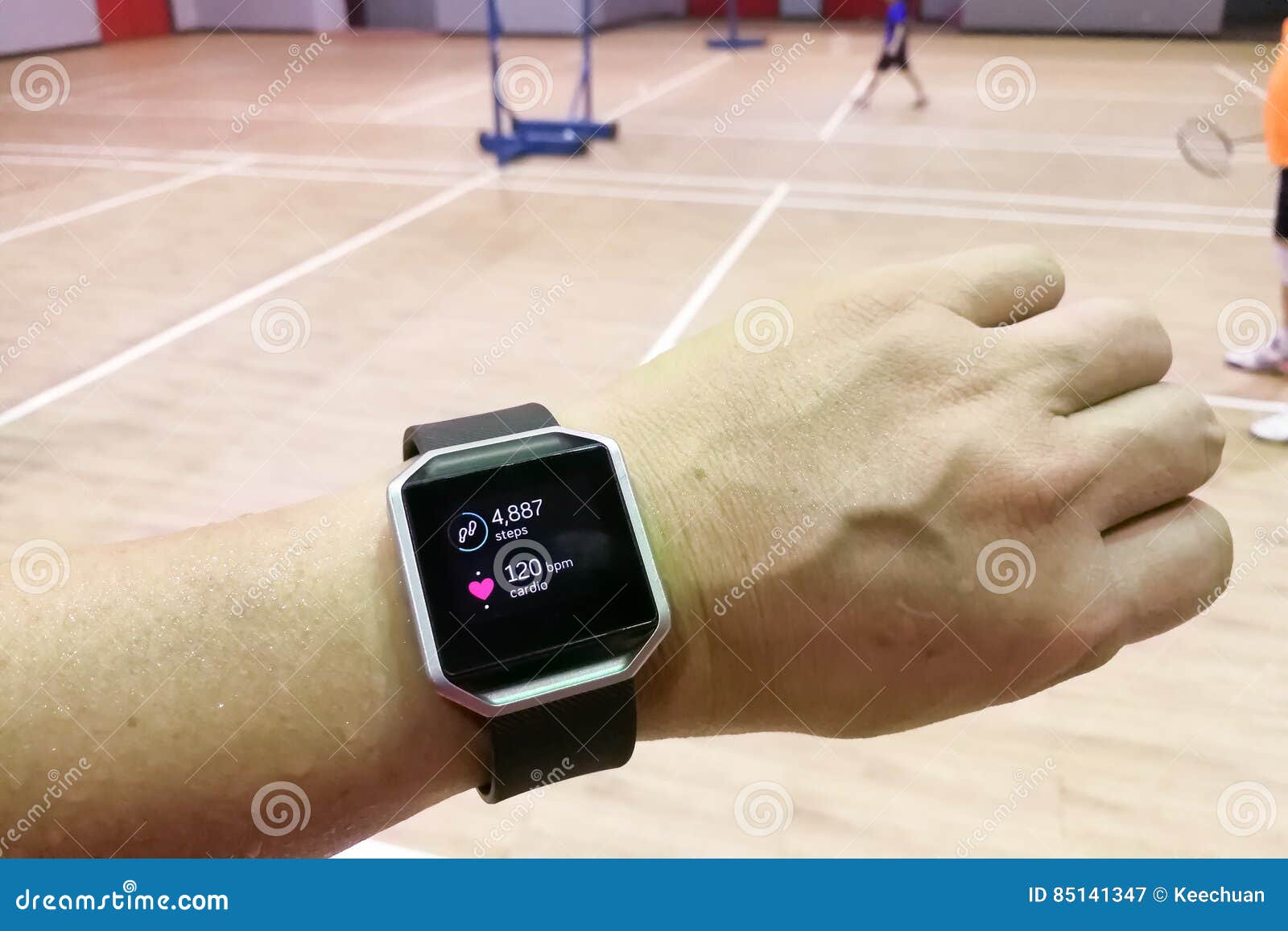 Perspective View Person Reading Watch with Heart Tracker during Stock ...