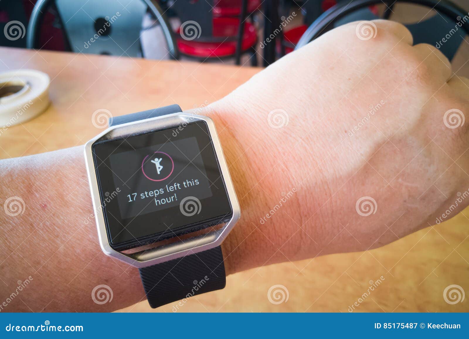 Perspective View Person Reading Watch with Steps and Heart Tracker ...