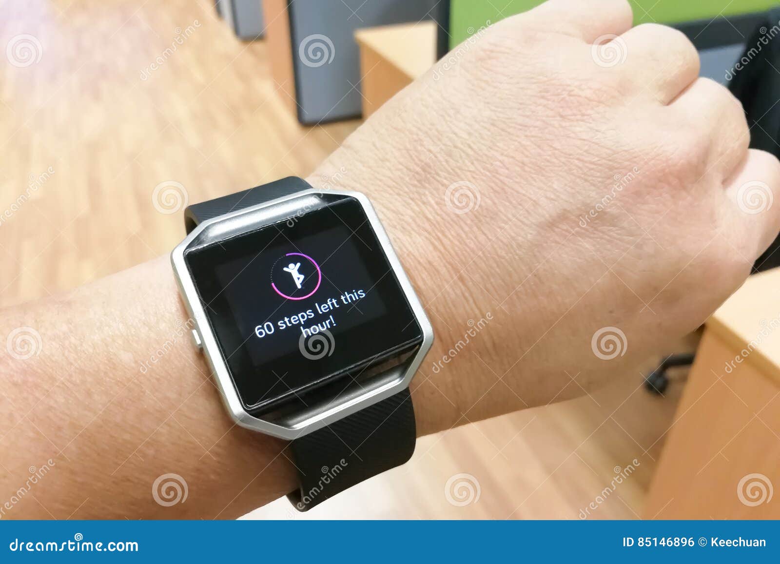 Perspective View Person Reading Watch with Steps and Heart Tracker in ...