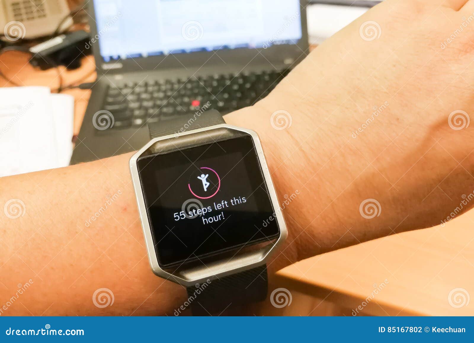 Perspective View Person Reading Watch with Steps and Heart Tracker in ...