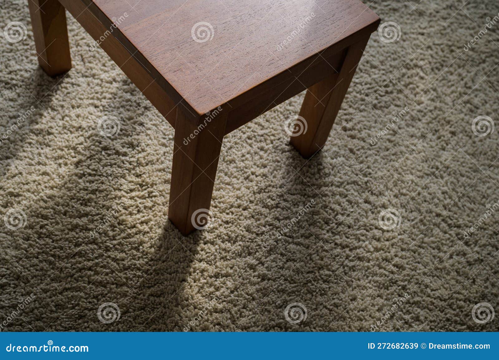 Perspective View of Small Teak Table on Beige Carpet. Stock Image ...