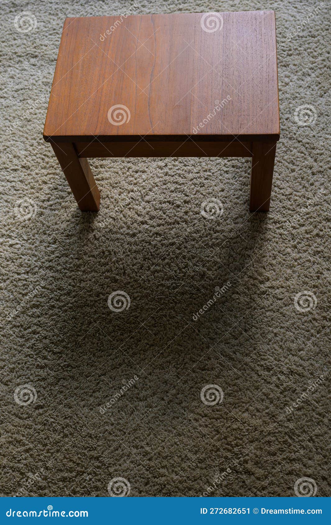 Perspective View of Small Teak Table on Beige Carpet. Stock Image ...