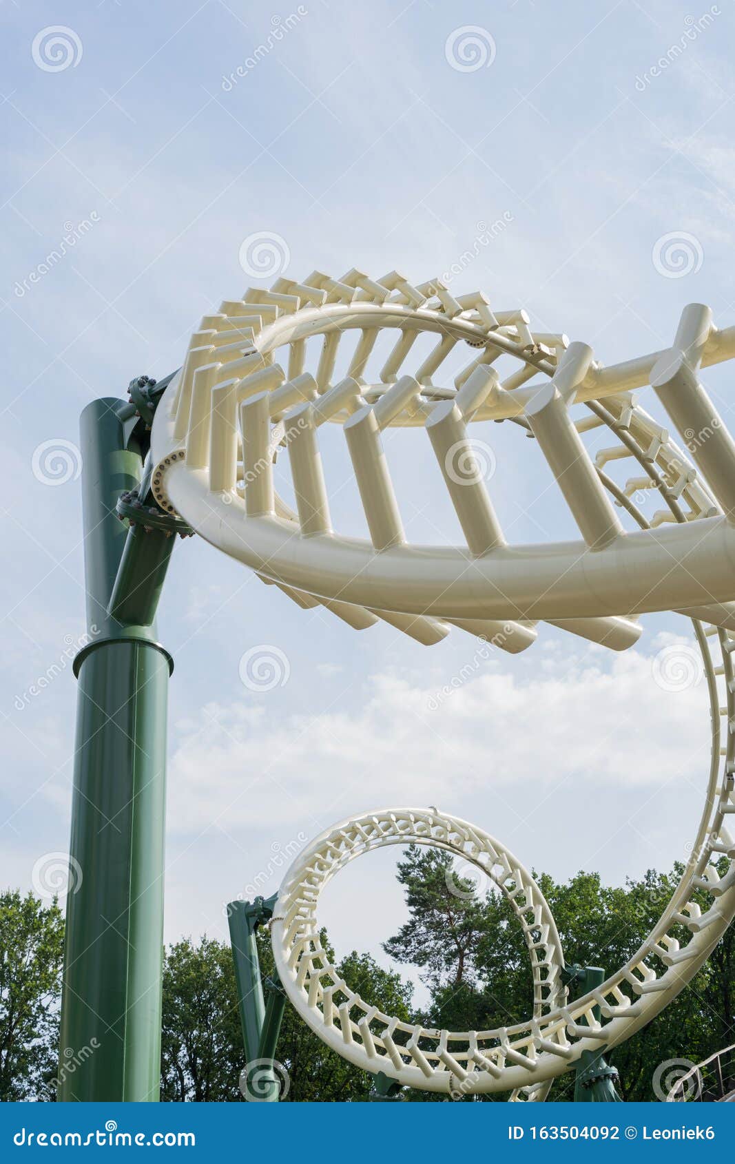 A Perspective View of Two Inverted Loops of a Roller Coaster Against a ...