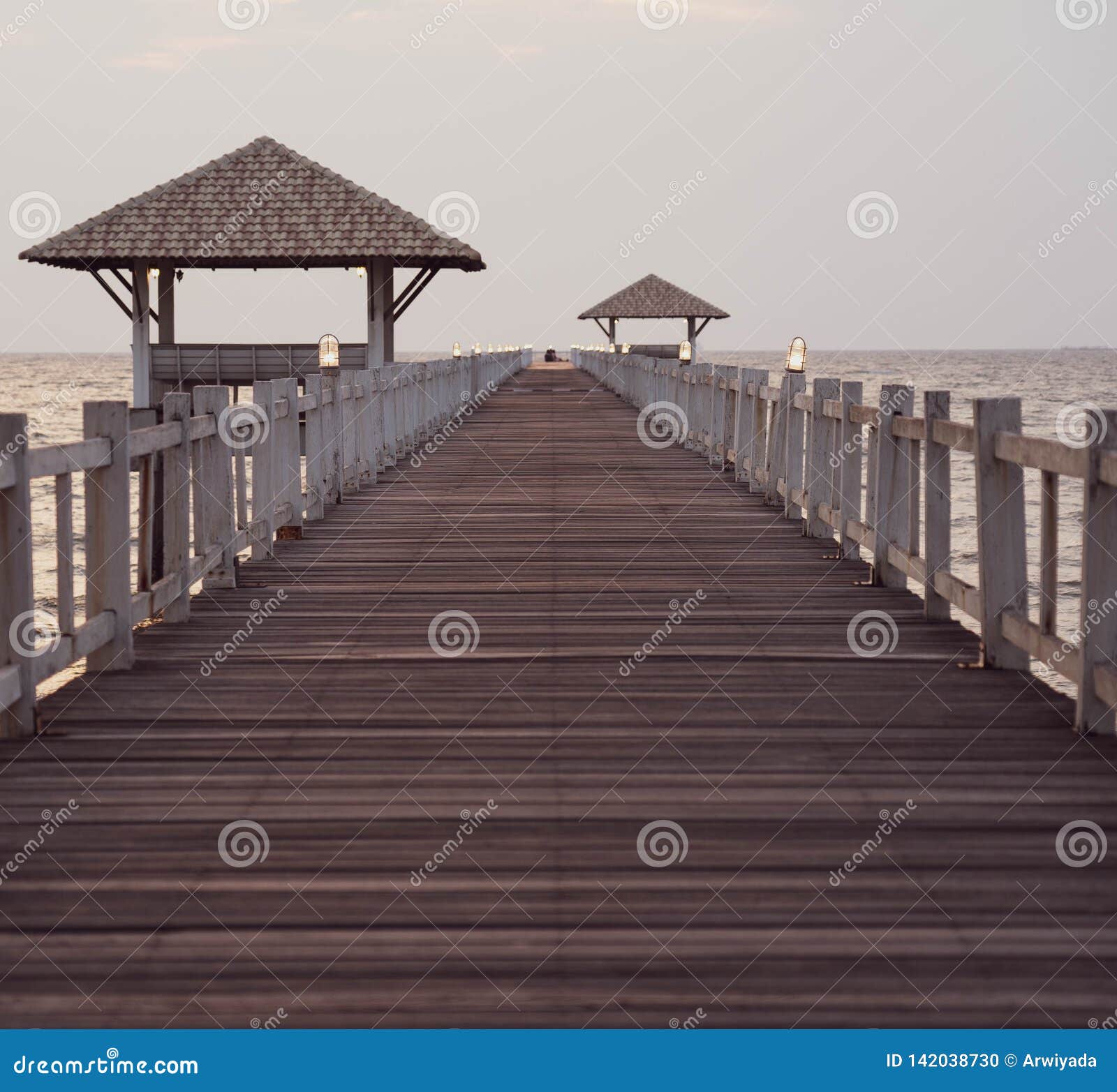 Perspective View of Wooden Bridge Extending into the Sea Stock Photo ...