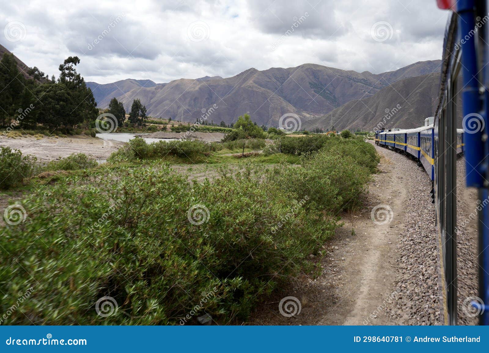 A Perurail Train Travelling through the Andes from Cusco To Puno with ...
