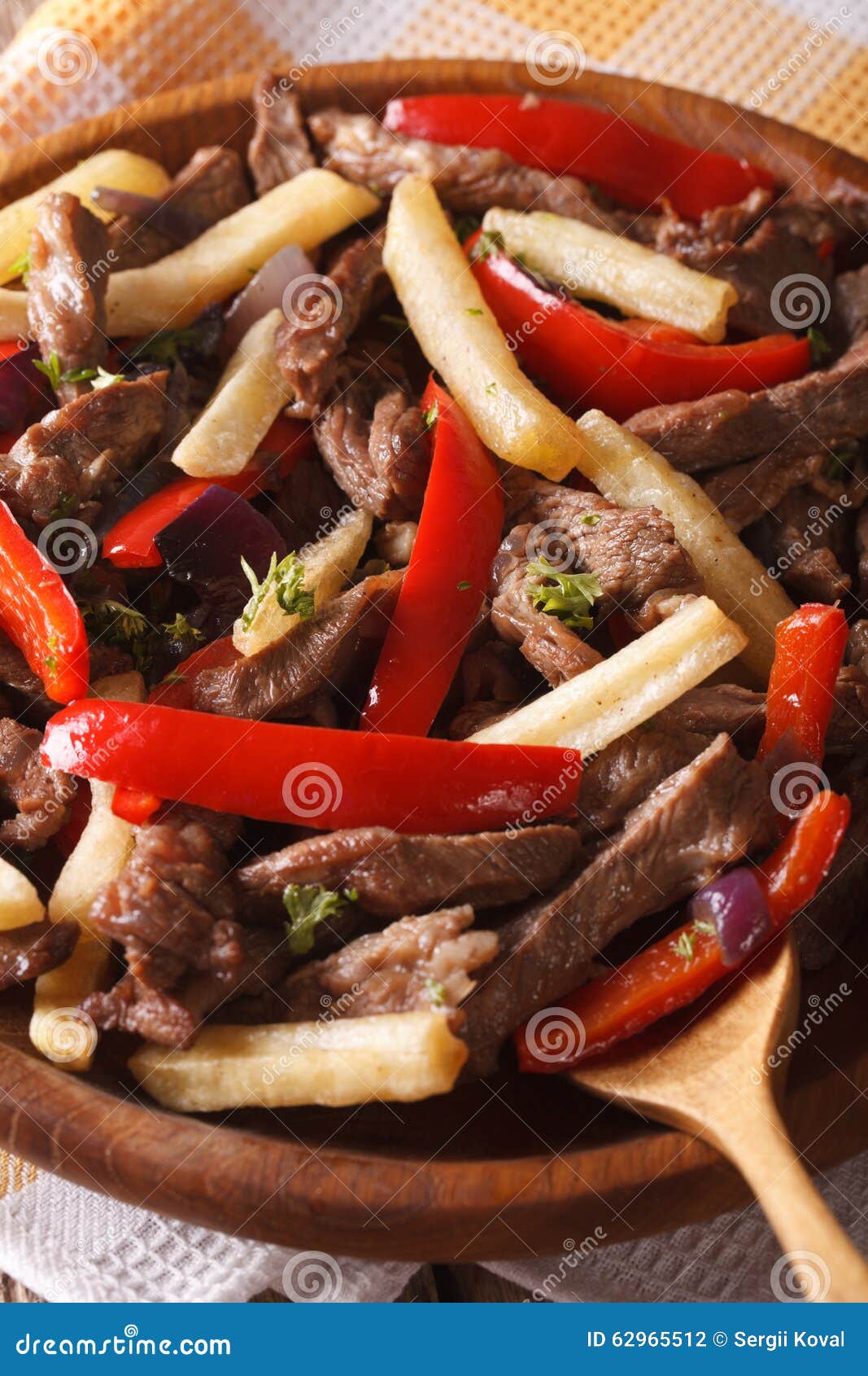 Peruvian Cuisine: Lomo Saltado Close-up on a Plate. Vertical Stock ...