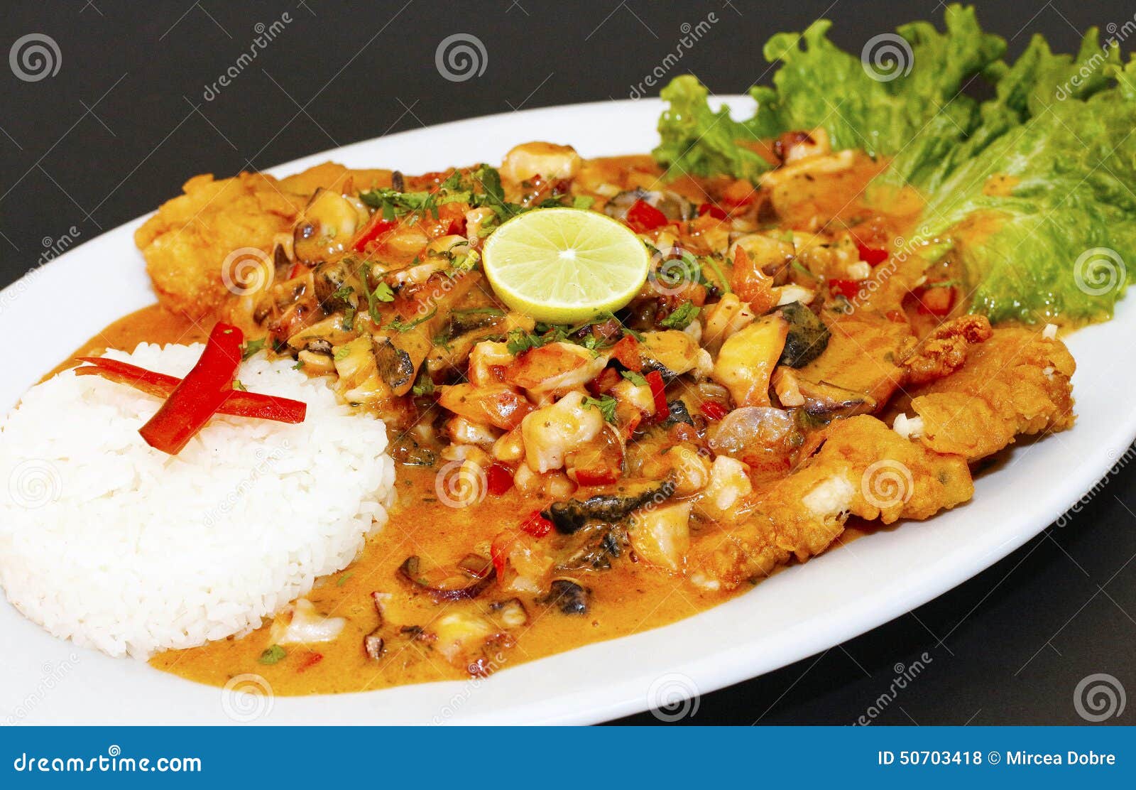 Peruvian Culinary Fried Fish a Lo Macho Style with Seafood Sauce Stock ...