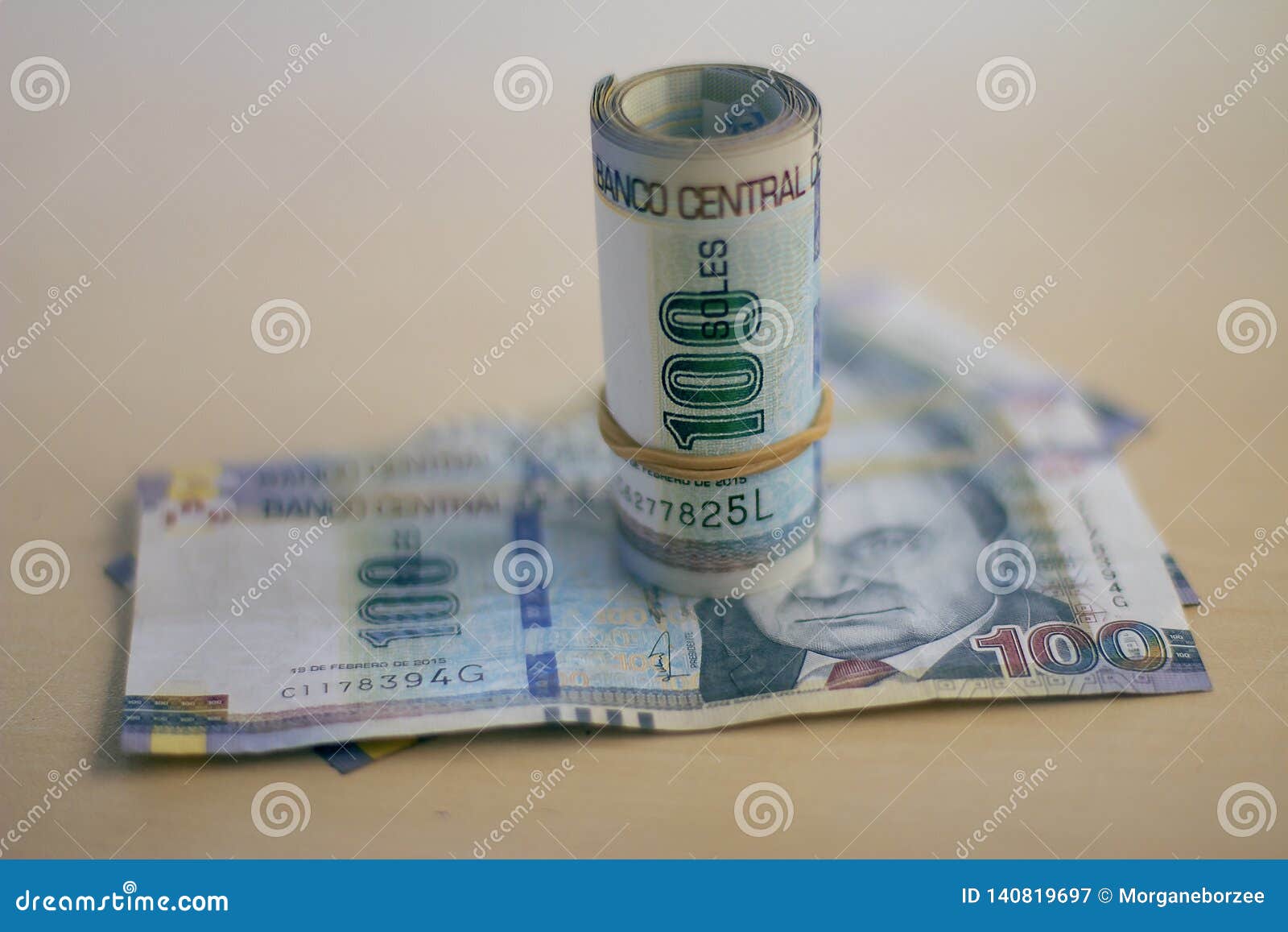 Peruvian Currency Soles Bills Rolled with Rubber on a Wooden Table ...