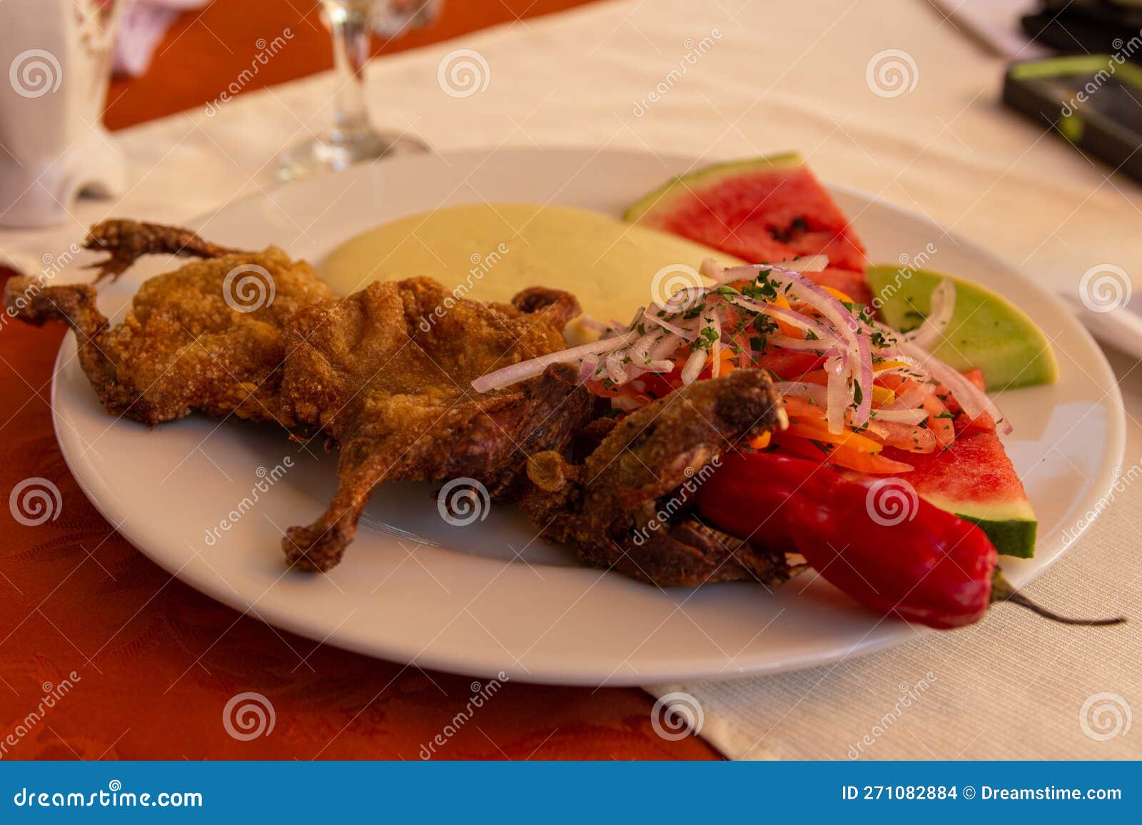 Peruvian Cuy Served on a Plate Stock Photo - Image of salad, chili ...