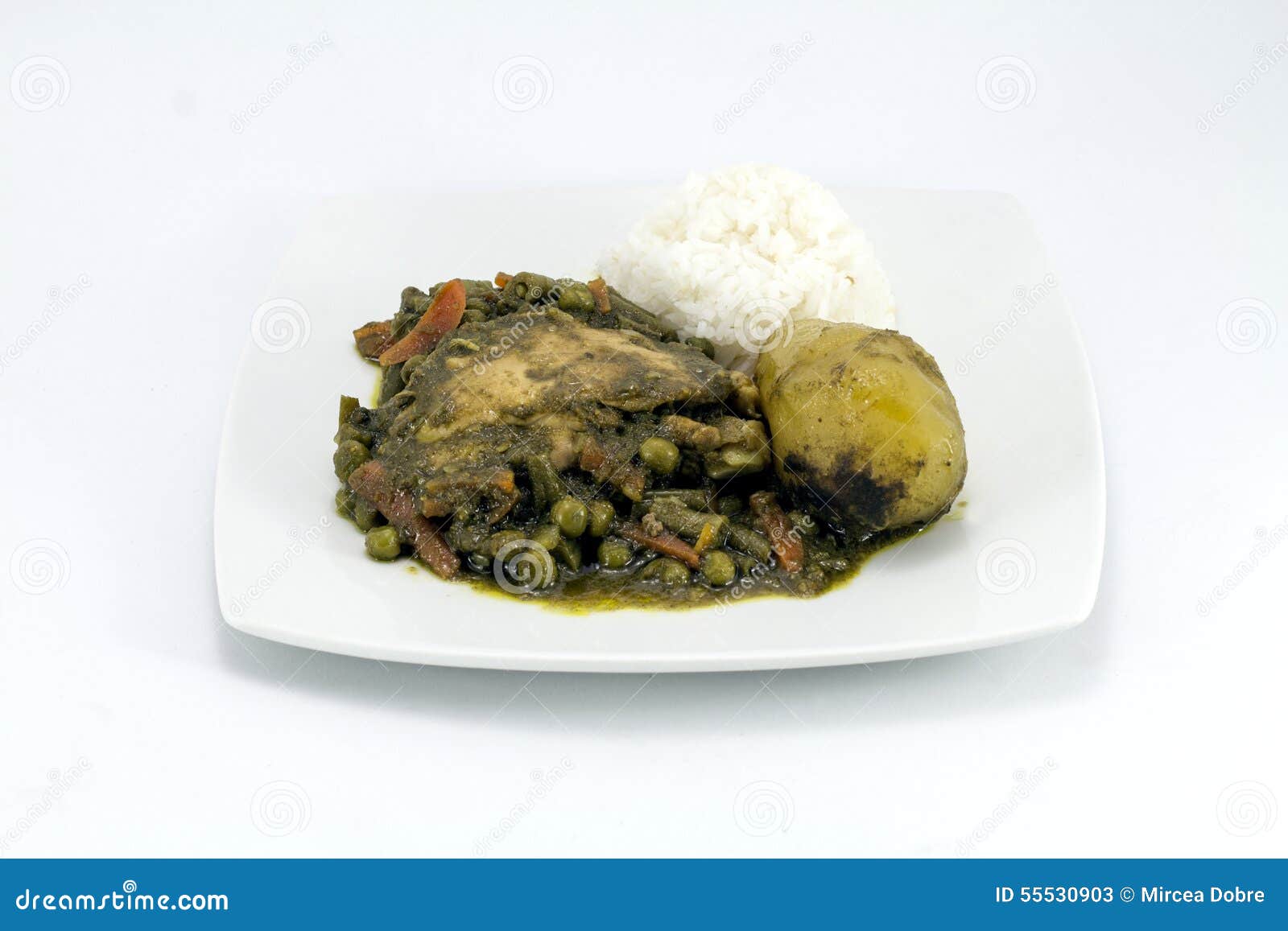 Peruvian Dish Called Seco De Pollo Made of Chicken, Rice, Potatoes ...