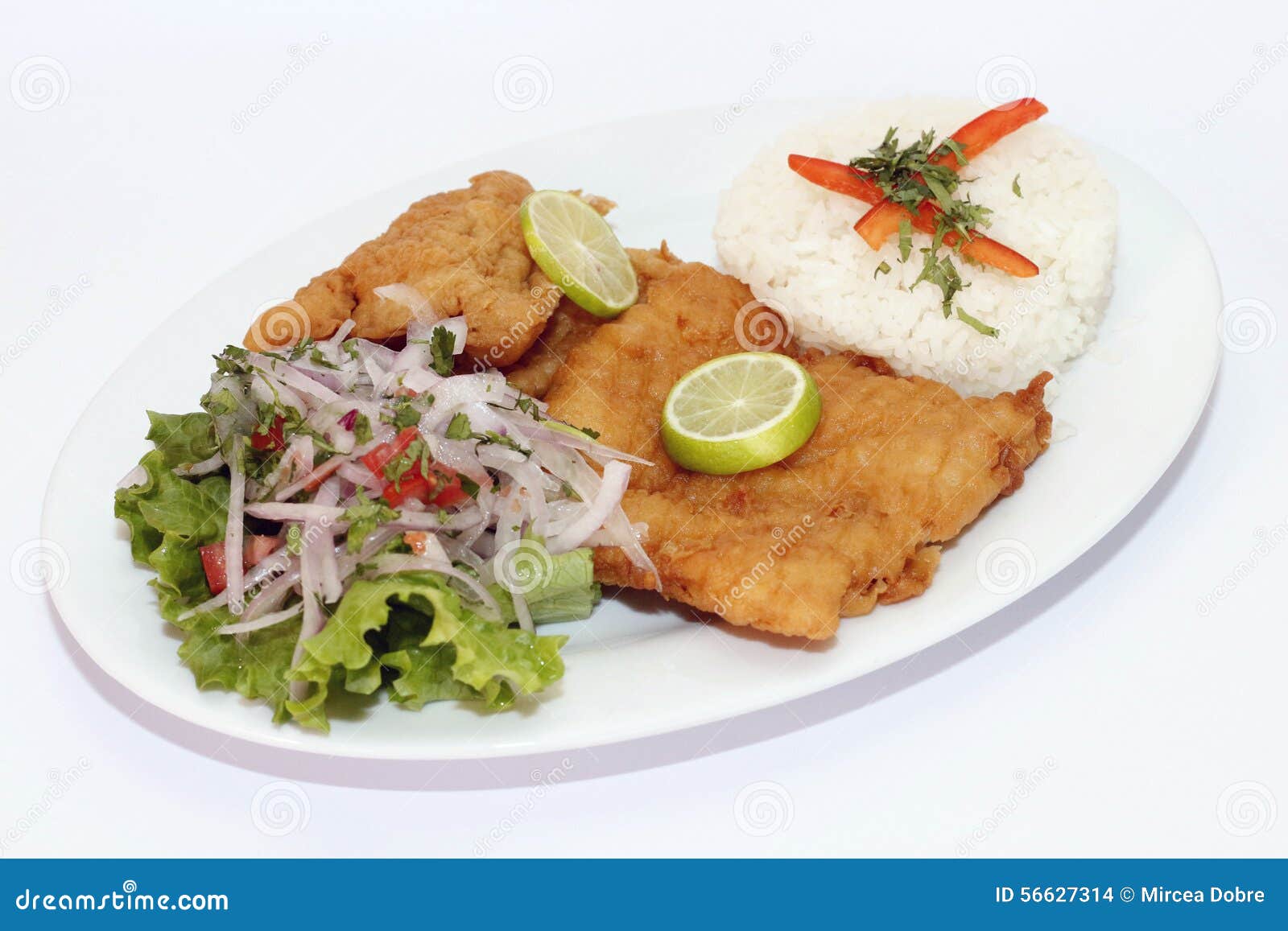 Peruvian Dish: Fried Fish with Salad, Lemon and Rice. Stock Photo ...