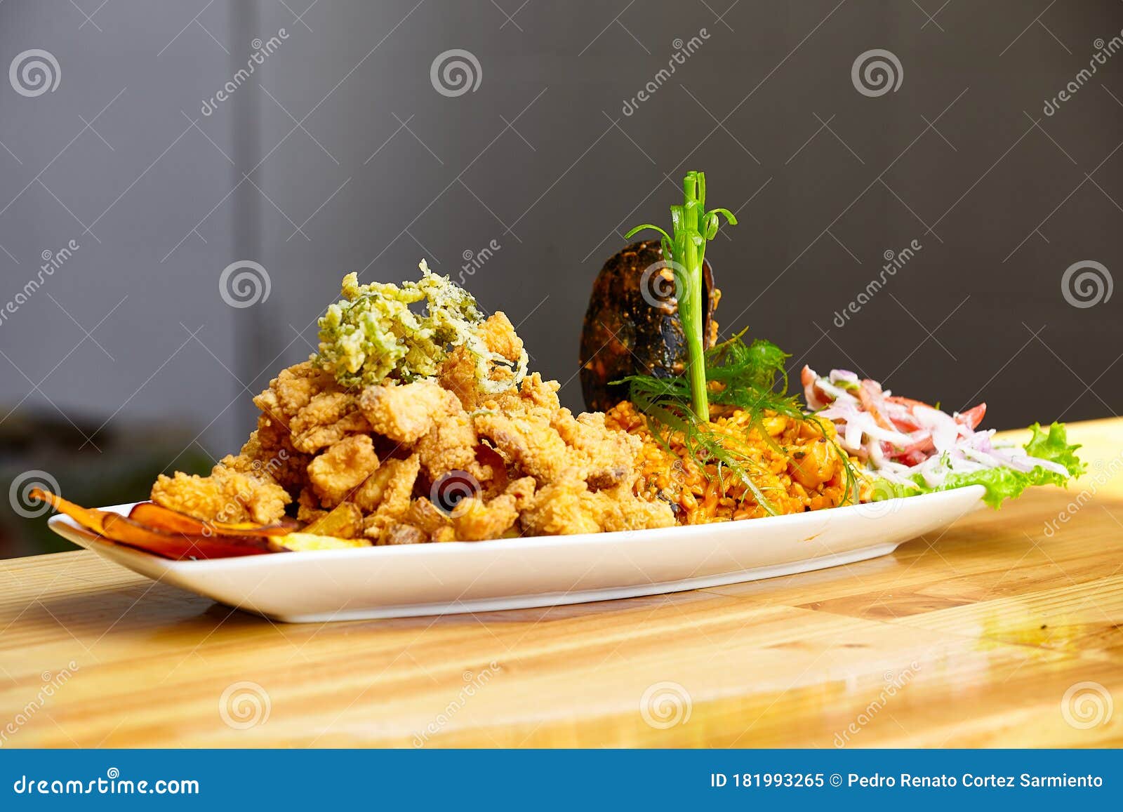 Peruvian Sea Cuisine with Rice Fried Octopus Stock Image - Image of ...