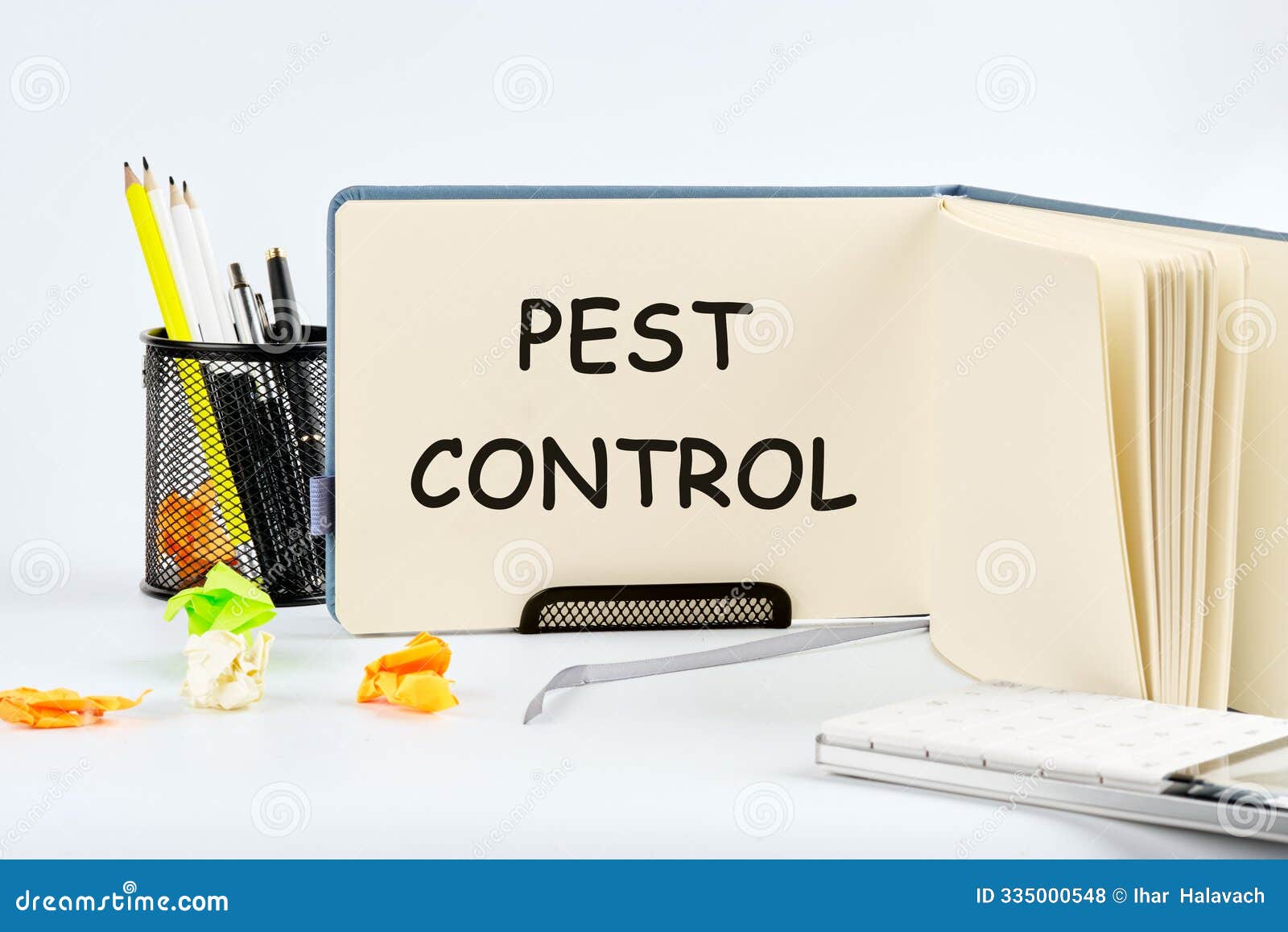 PEST CONTROL Written on a Blank Sheet of Notepad in the Stand Stock ...