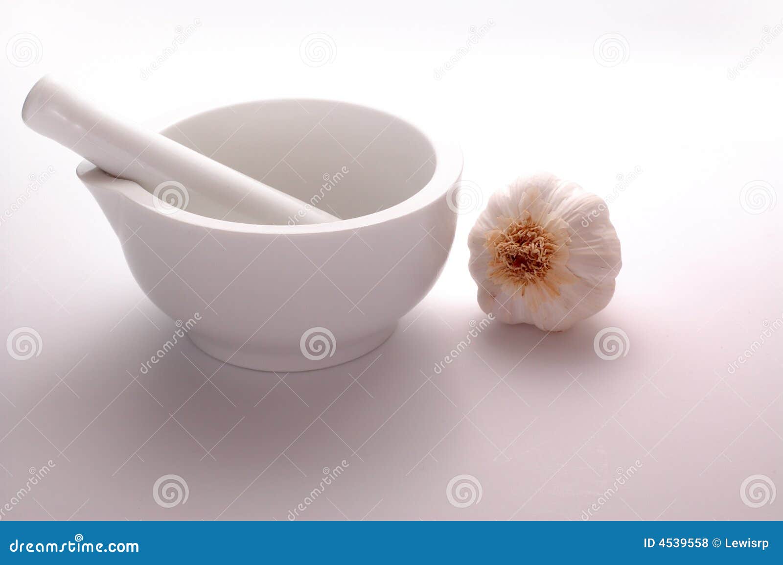 Pestel and Mortar with Garlic Stock Photo - Image of white, garlic: 4539558