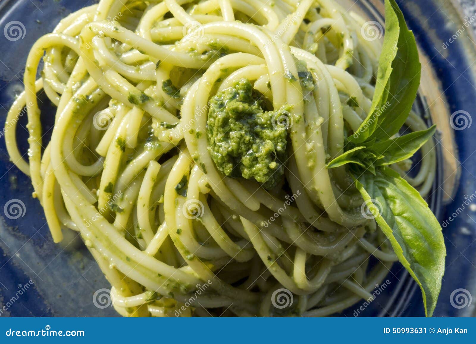 Pesto pasta on plate stock image. Image of mediterranean - 50993631