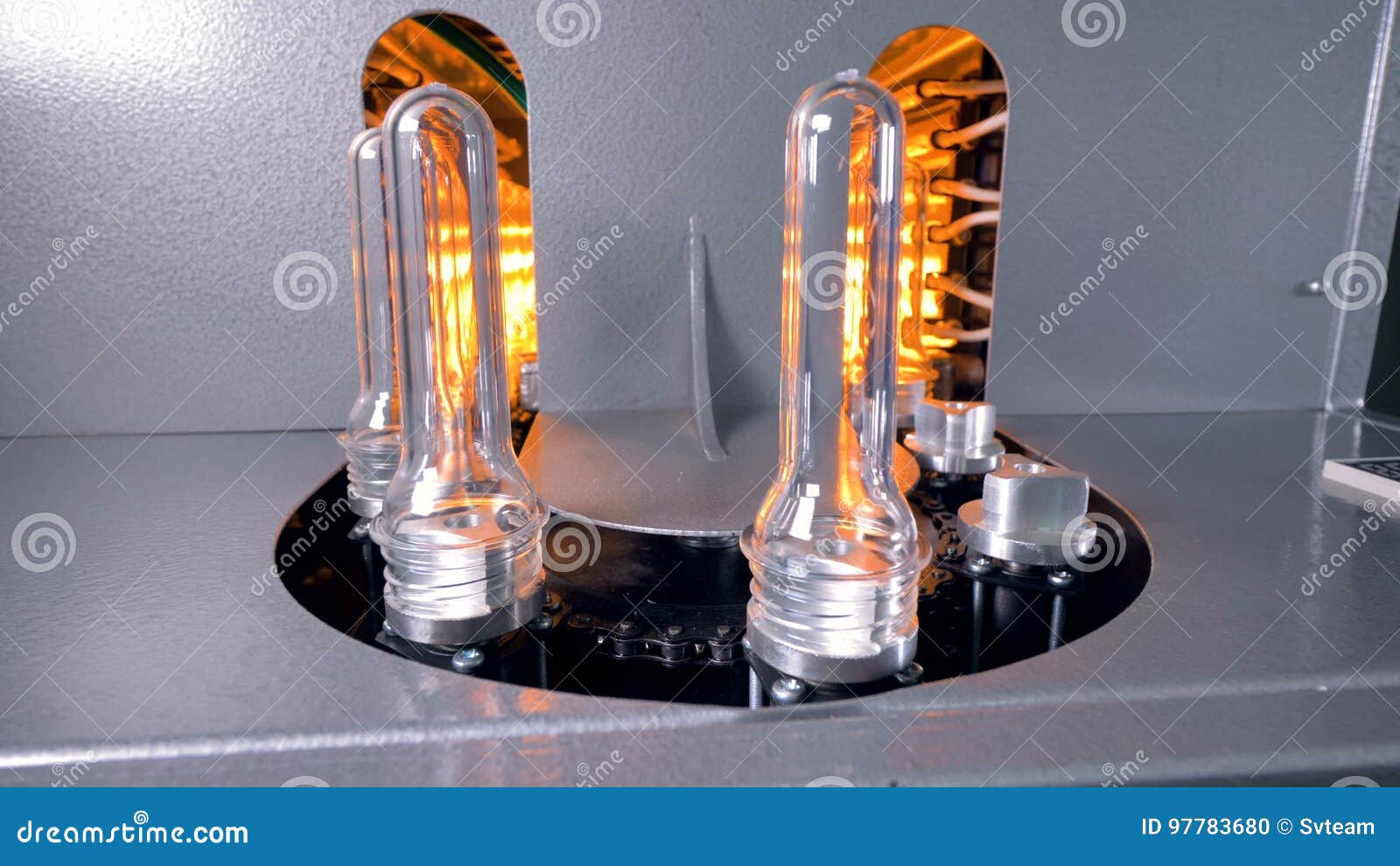 PET Preforms Move on Heating Oven Line in Fast Speed. Plastic Bottles ...