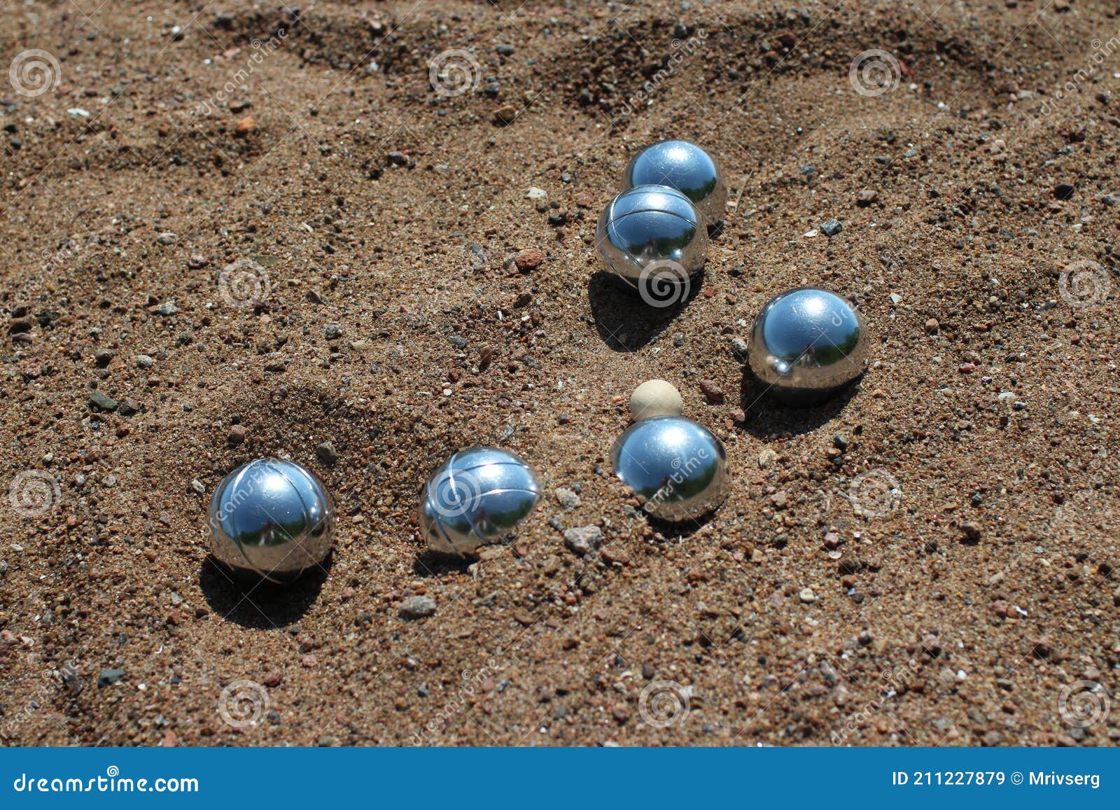 Petanque game on the beach stock image. Image of sand - 211227879