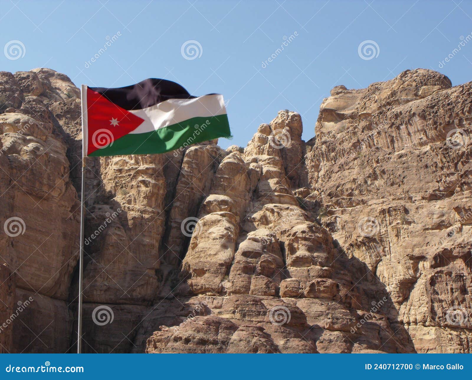 Jordanian Flag on the Mountain of Petra, Jordan Stock Photo - Image of ...