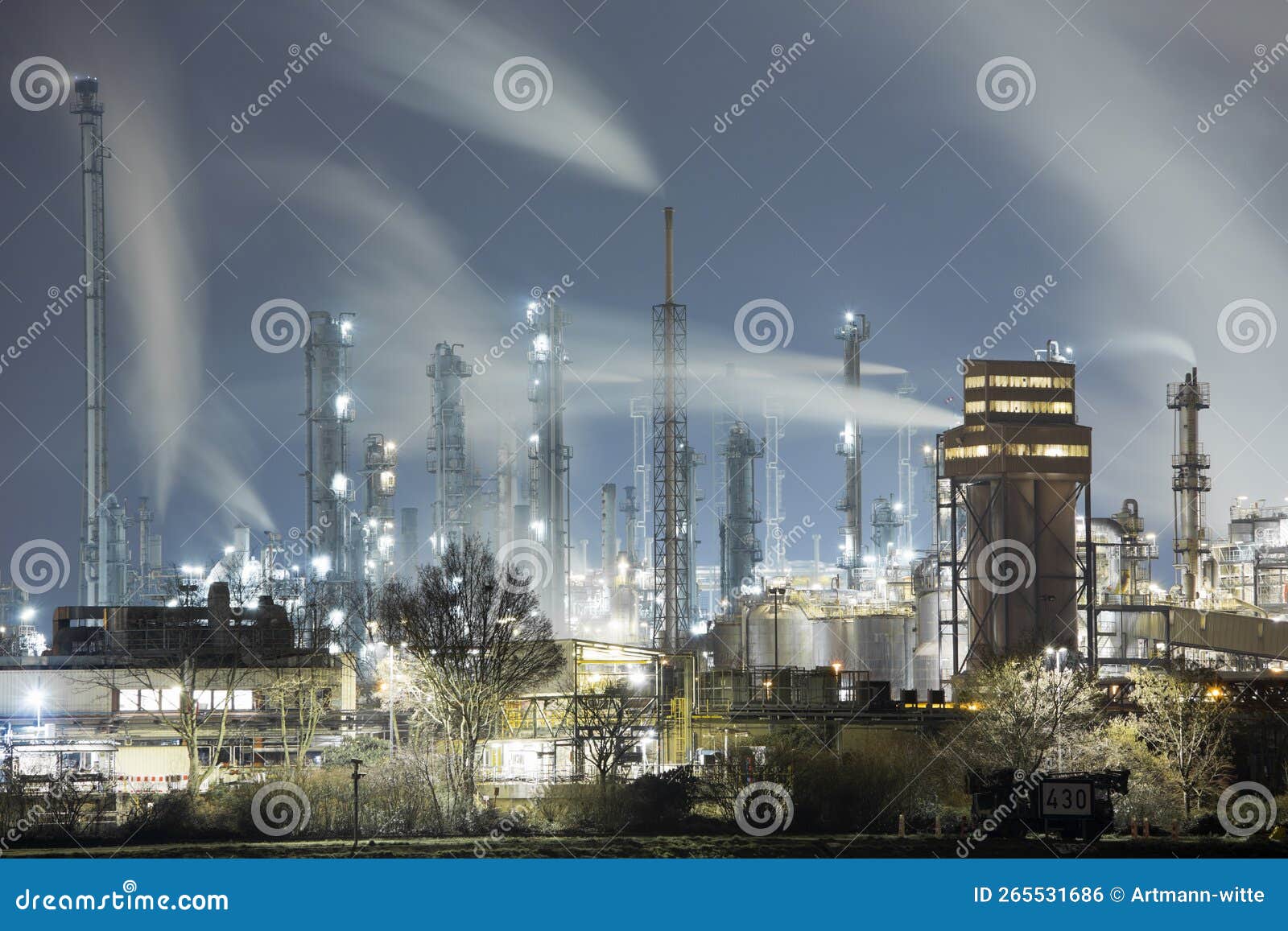 Petrochemical Factory by Night Using Gas Causing Global Warming and ...