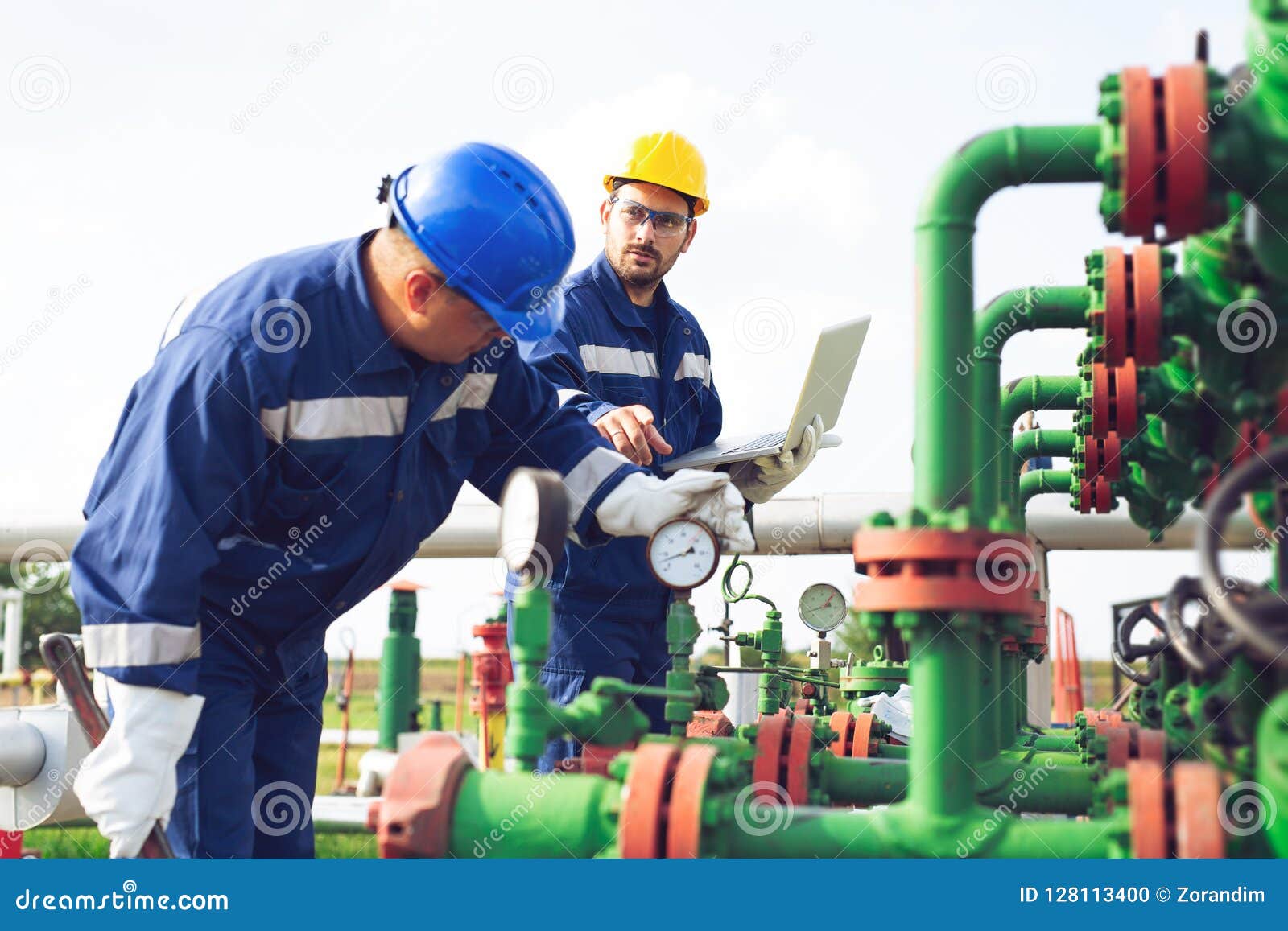 Petrochemical Workers Working at Refinery Plant Stock Photo - Image of ...