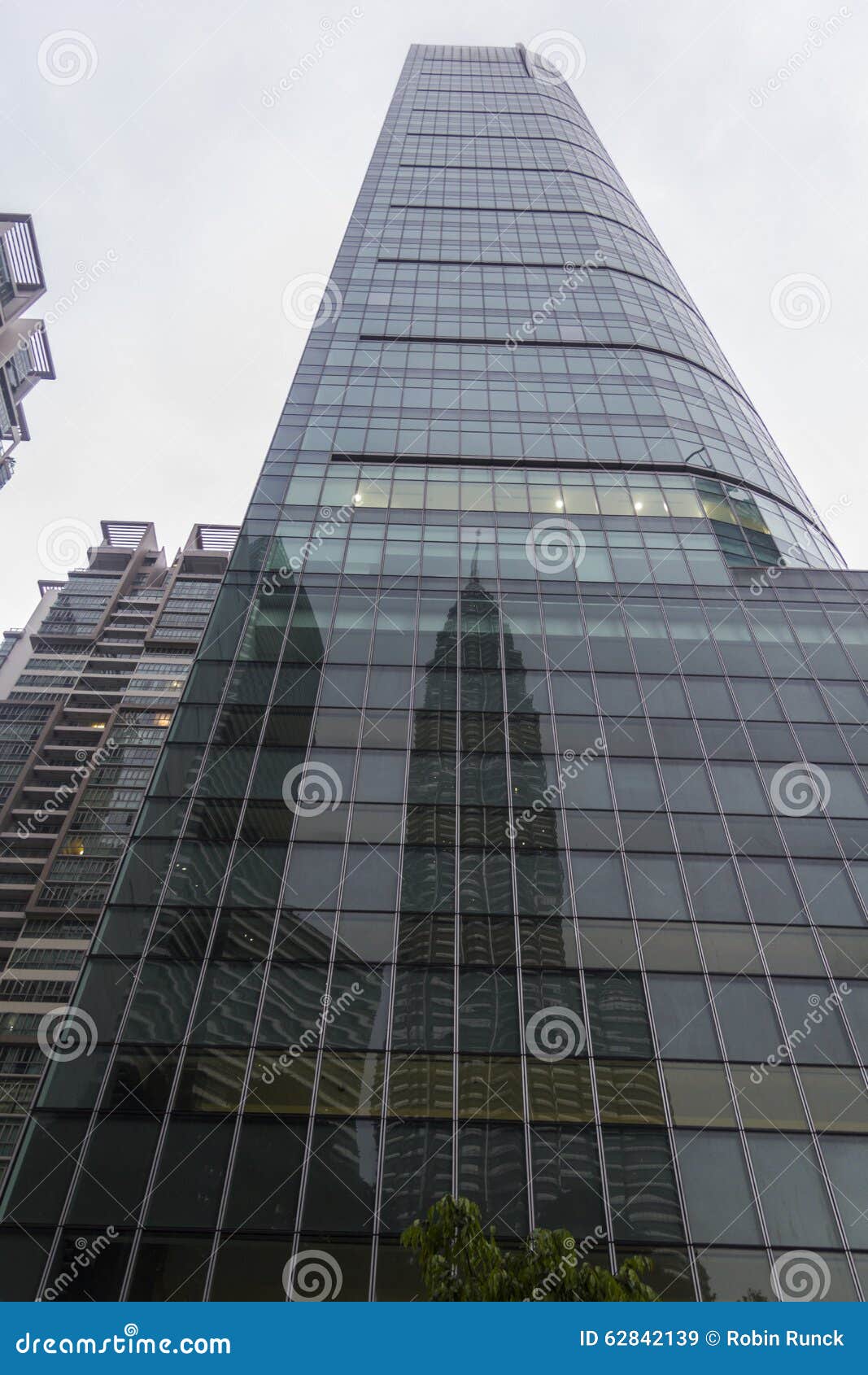 Petronas Tower Reflecting on Glass Windows Stock Image - Image of ...