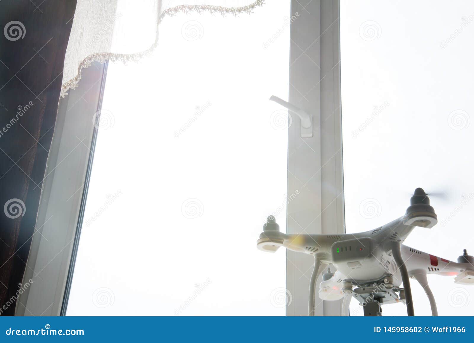 Phantom 3 Unmanned Quadrocopter Drone on the Window Editorial ...