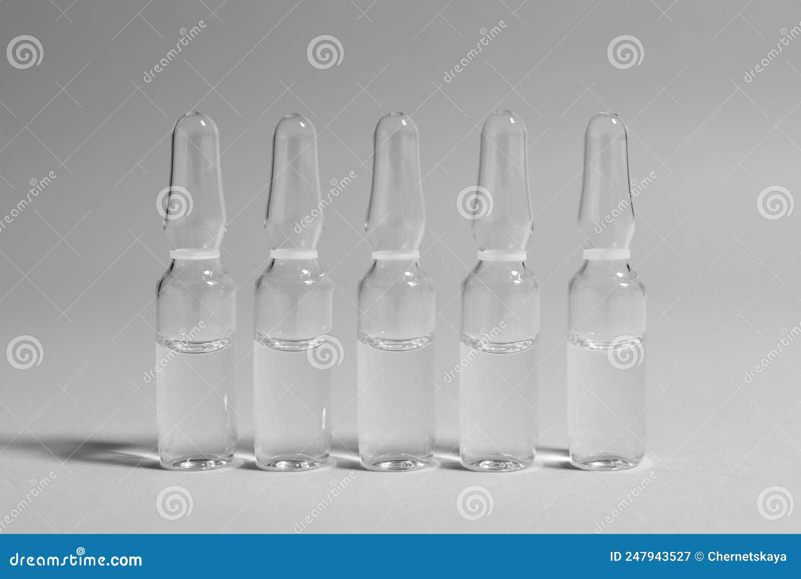Pharmaceutical Ampoules with Medication on Light Grey Background Stock ...