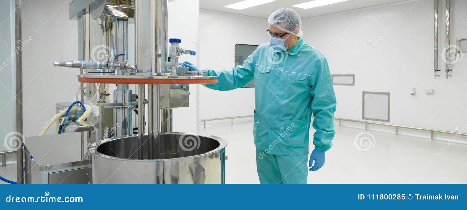 Pharmaceutical Factory Man Worker in Protective Clothing Working with ...