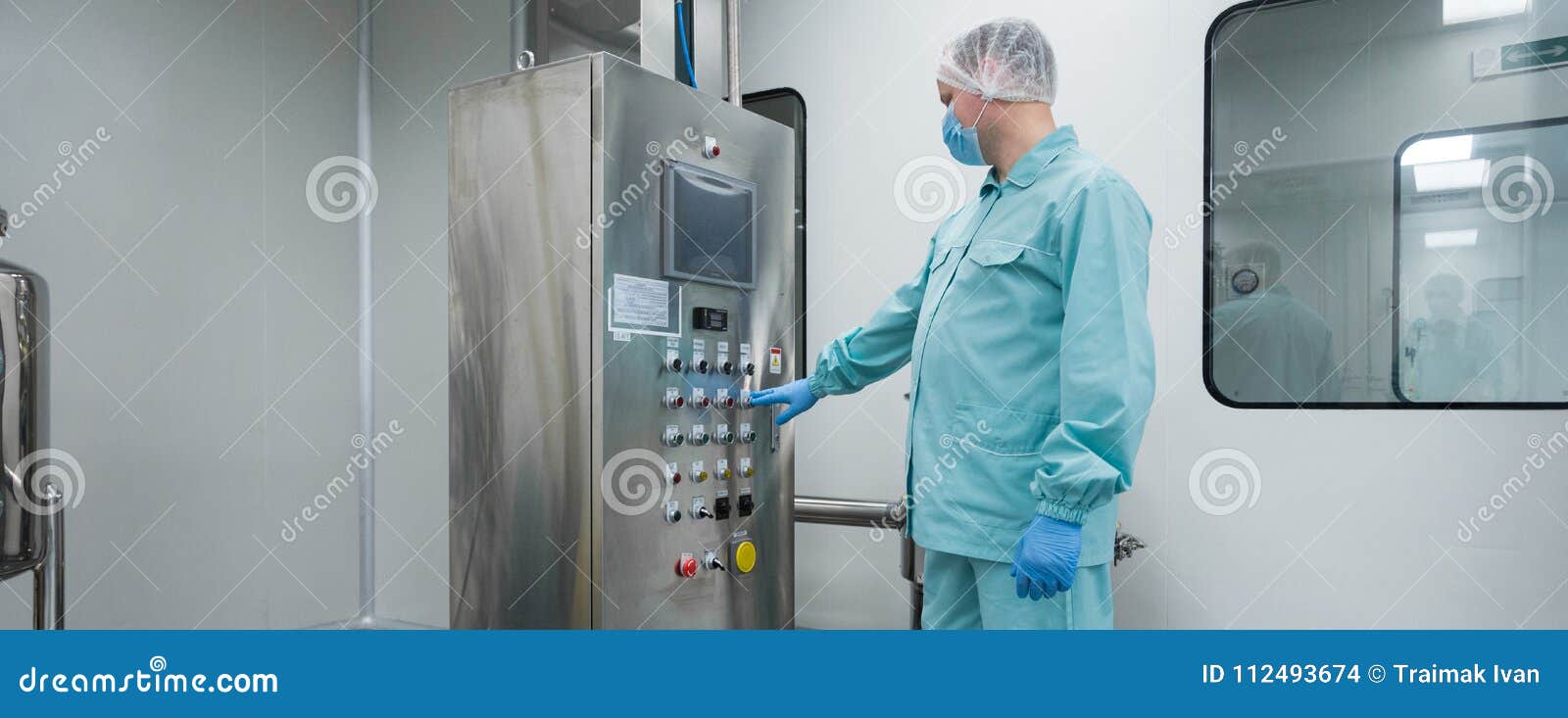 Pharmaceutical Factory Man Worker in Protective Clothing Working with ...