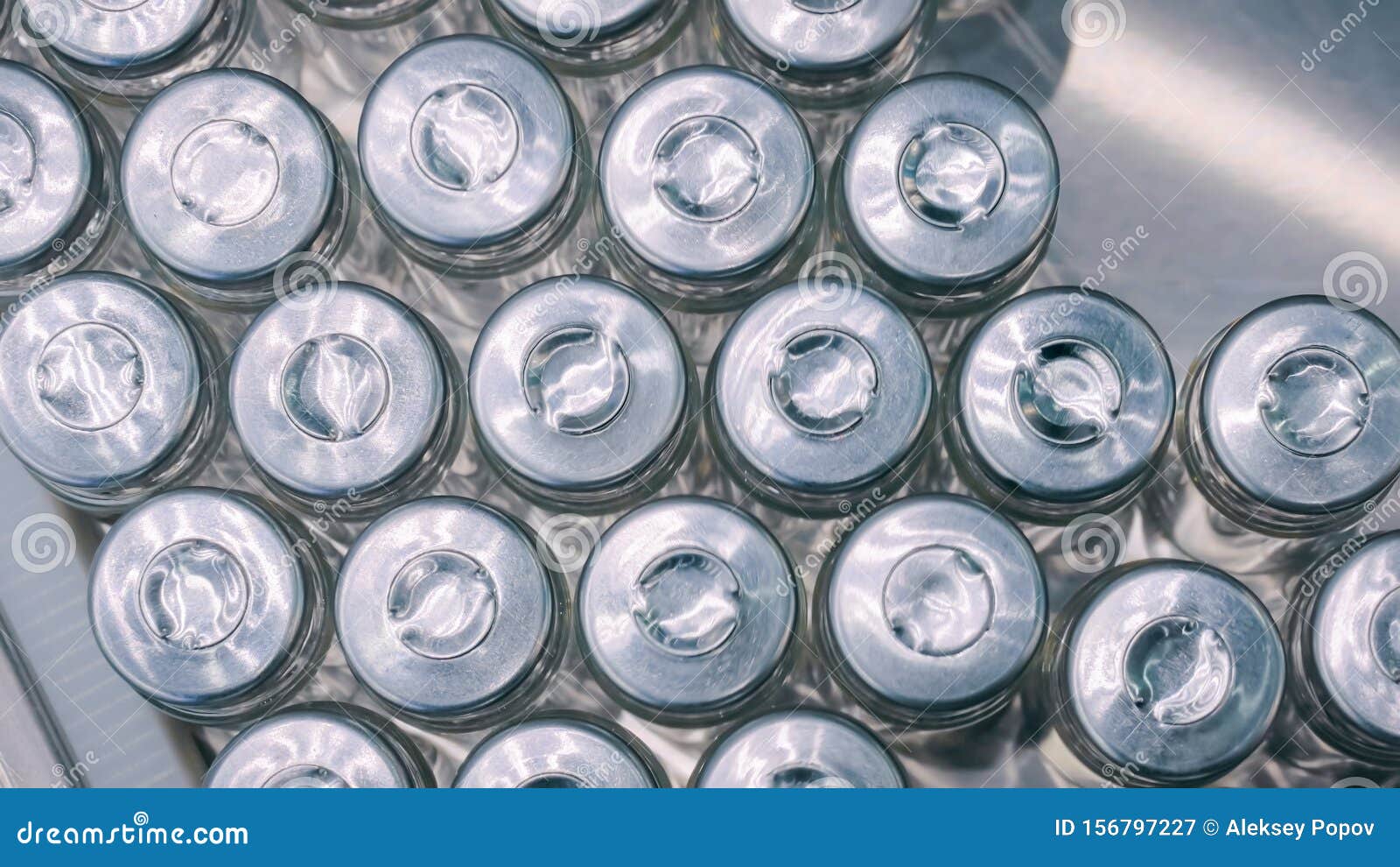 Pharmaceutical Production Line - Conveyor Belt with Empty Glass Bottles ... Pharmaceutical Production Line - Conveyor Belt with Empty Glass Bottles ...